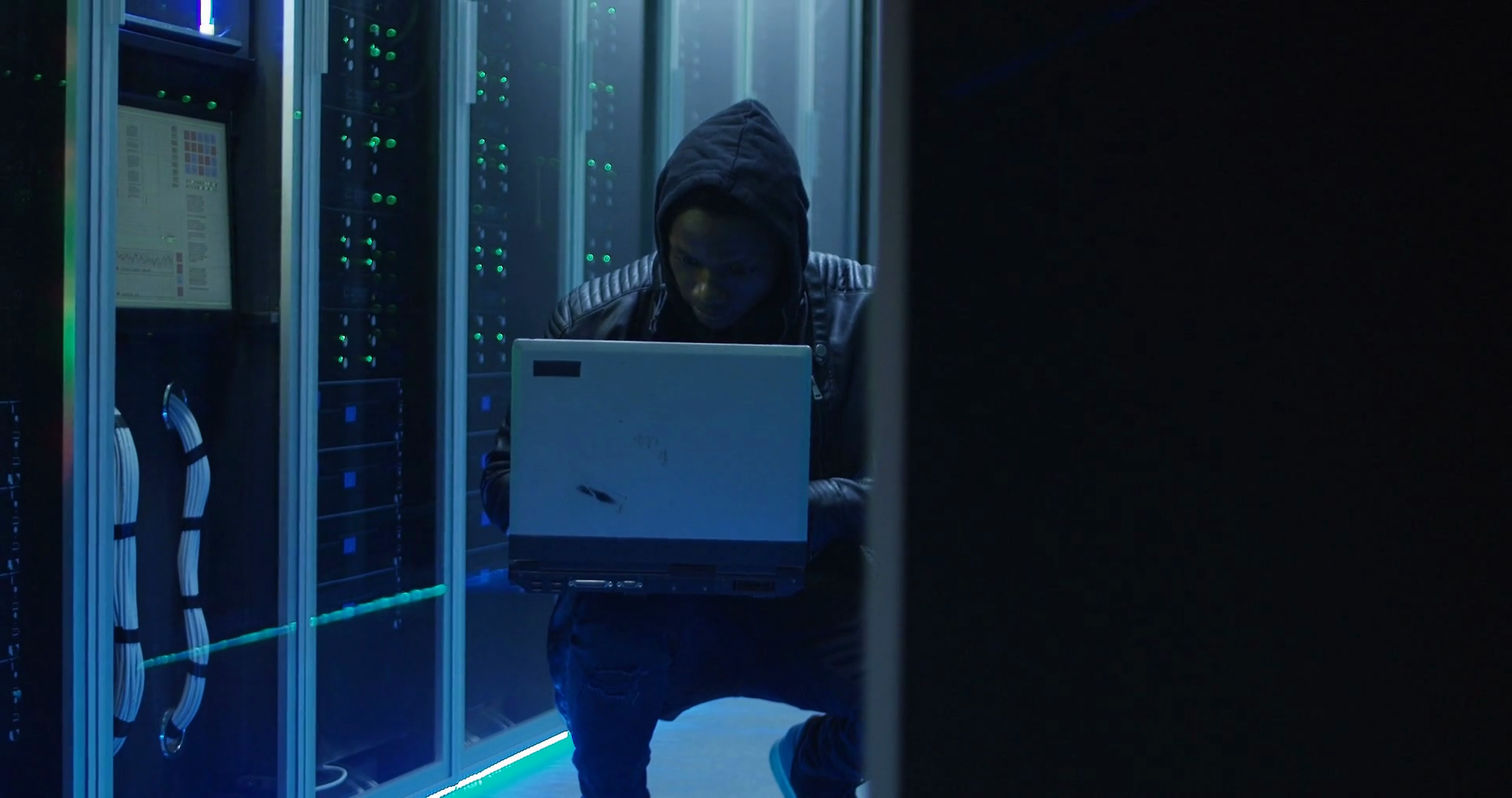 Medium Shot Of Hacker In Hoodie On Laptop In Stock Footage SBV ...