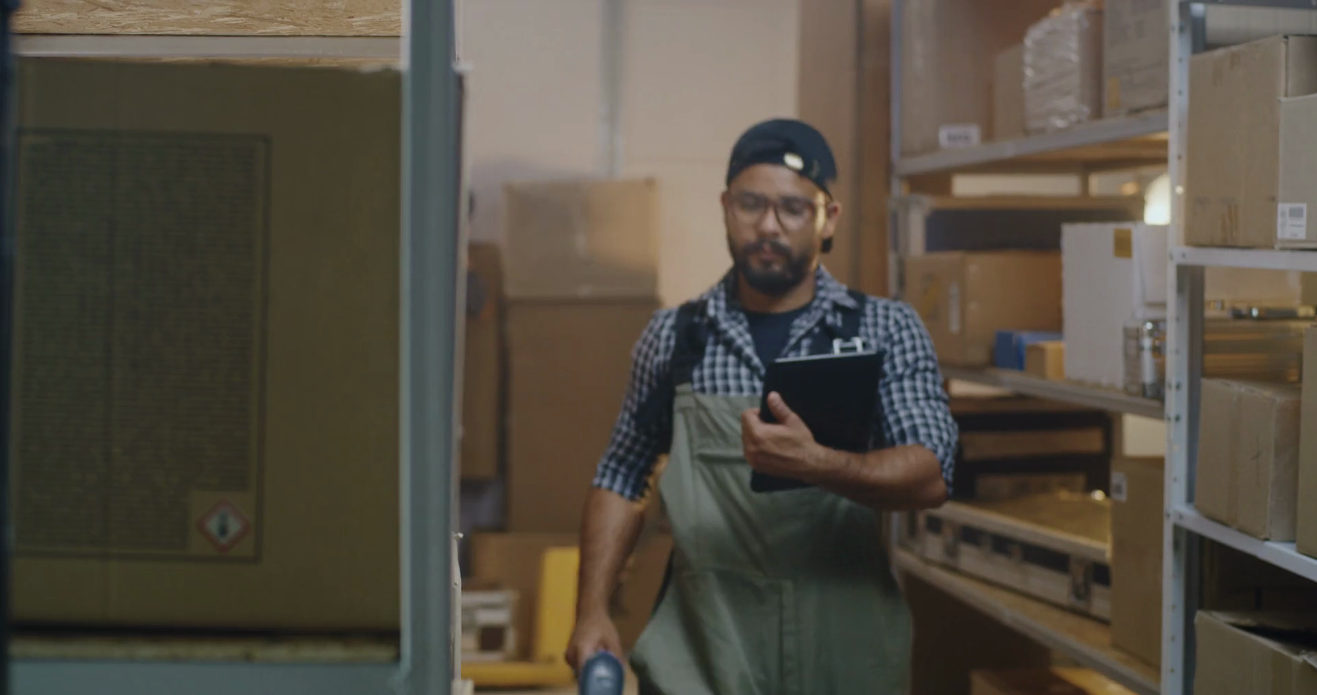Young Male Worker Checking Boxes In Stock Footage SBV-338598186 ...