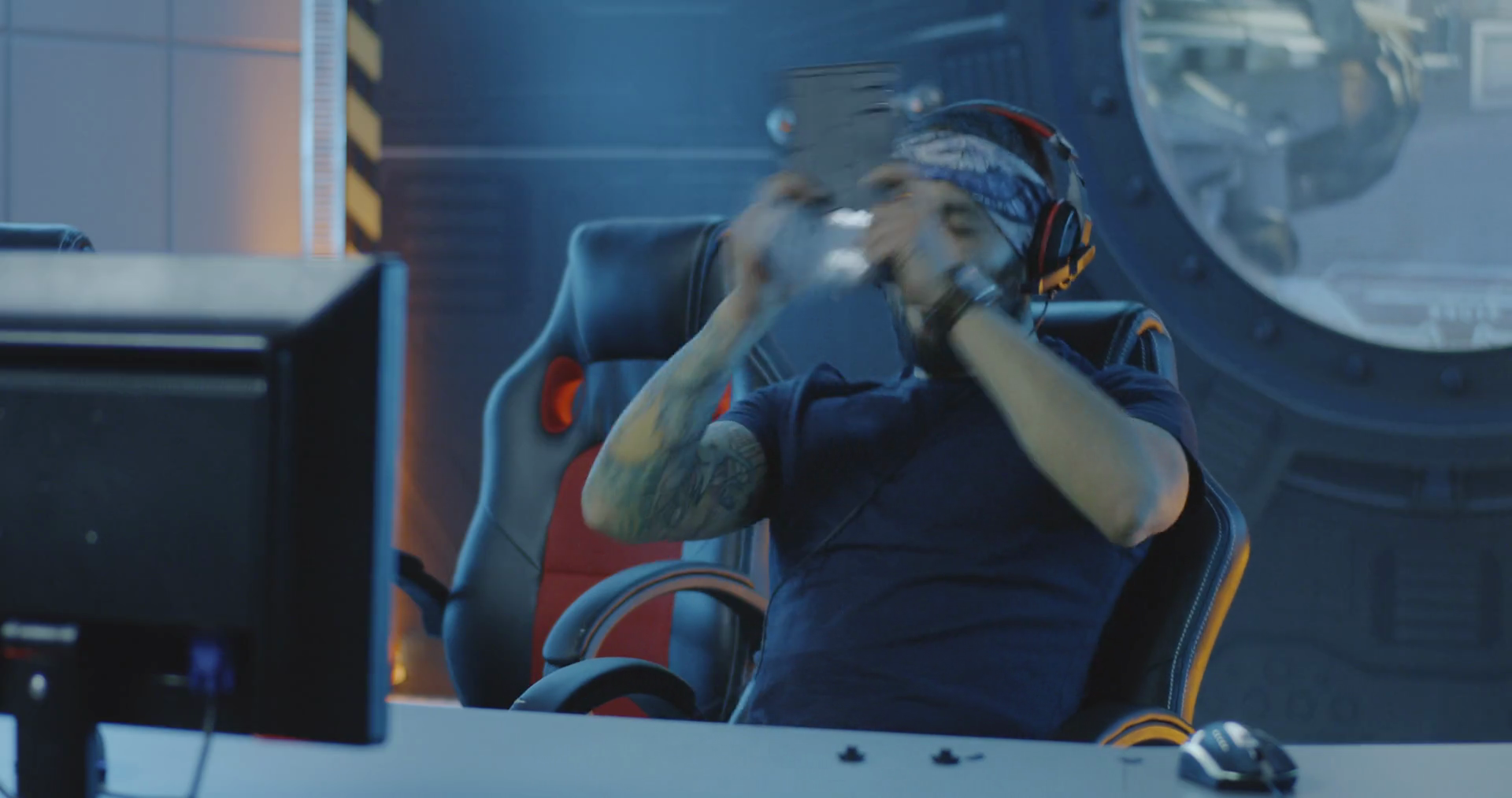 Medium shot of an angry gamer destroying keyboard after losing a match ...