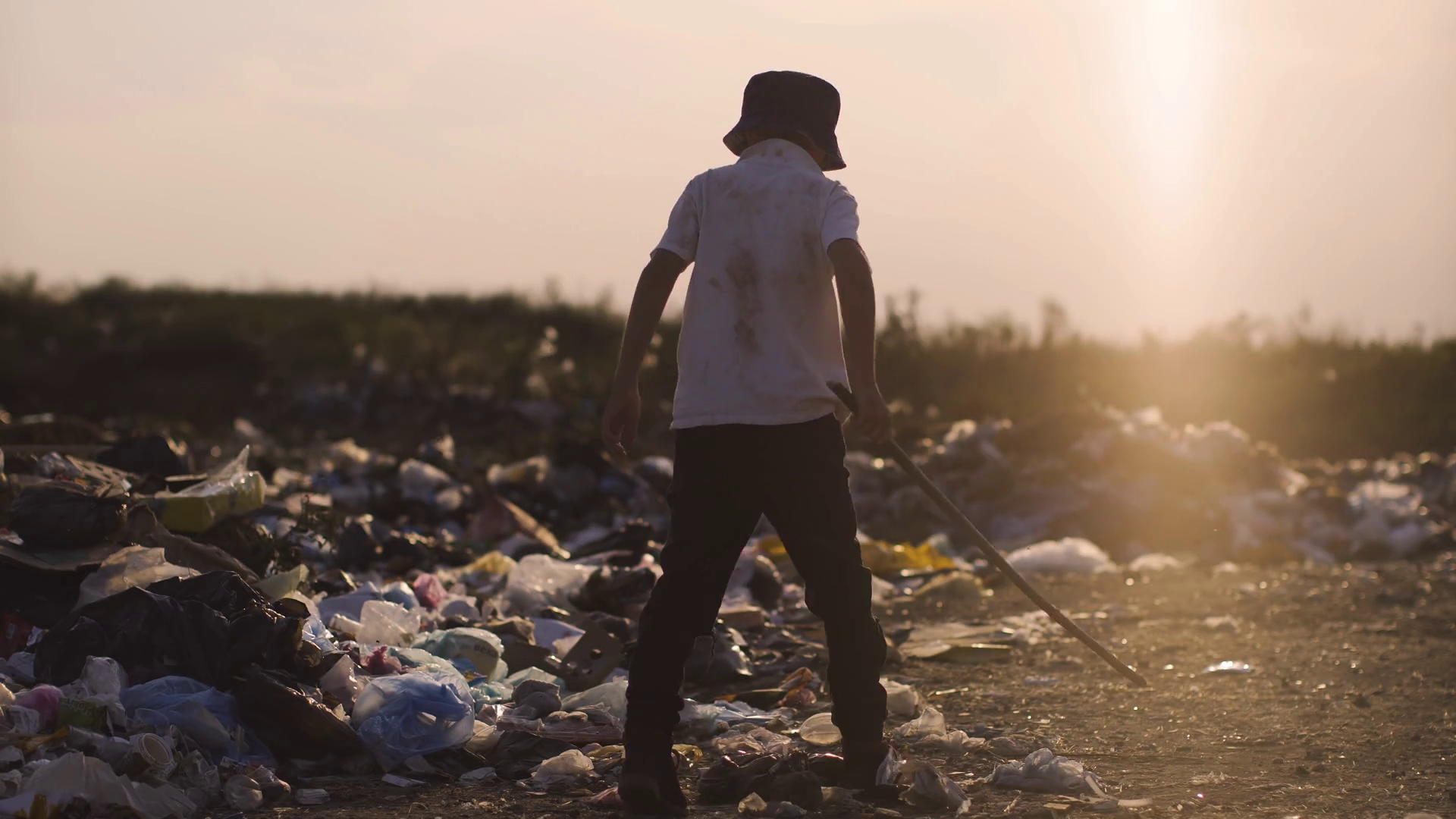 Medium Shot Of Boy Kicking Dust Hitting Stock Footage SBV-336503967 ...