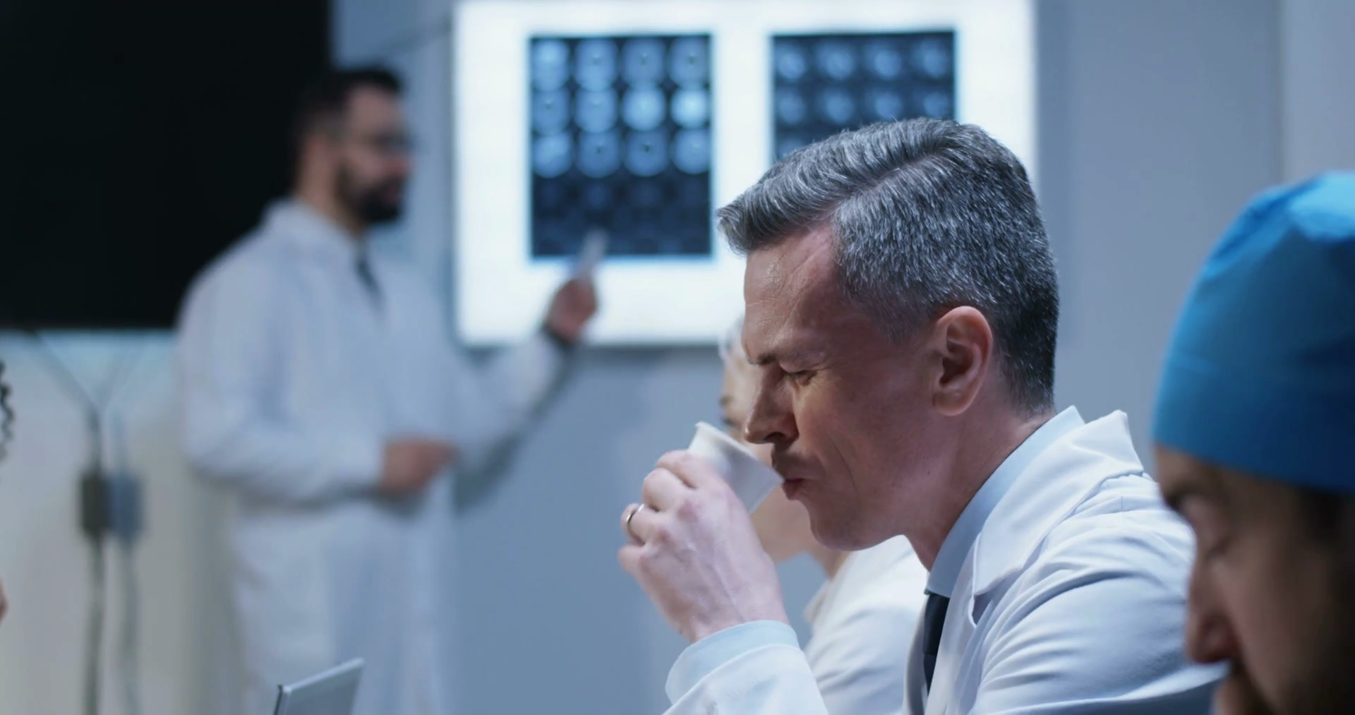 Medium Shot Of Doctors Watching Young Male Stock Footage SBV-334339525 ...