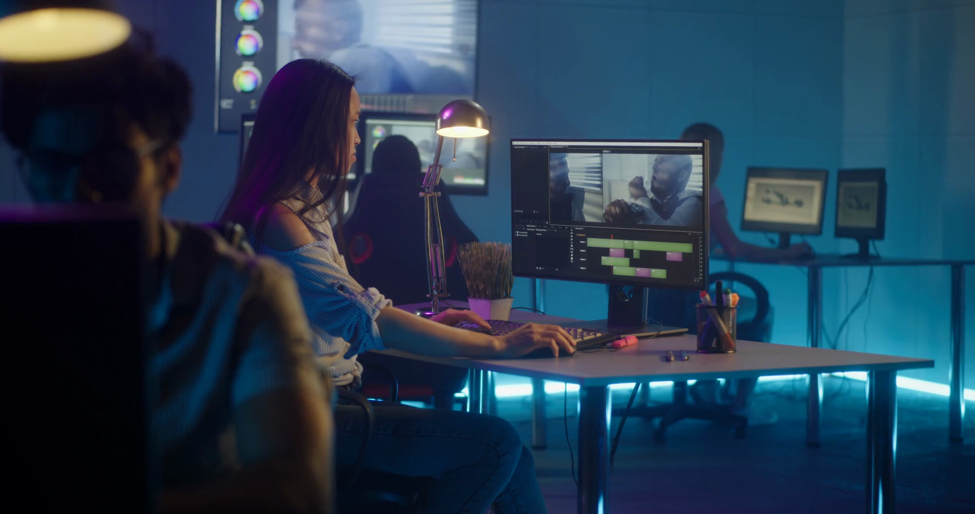 Medium Shot Of Video Editors Working At Stock Footage SBV-338558957 ...