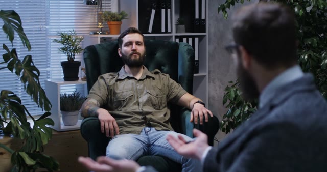 A Boy Talking To Man In Ground Stock Footage: Royalty-Free Video Clips ...