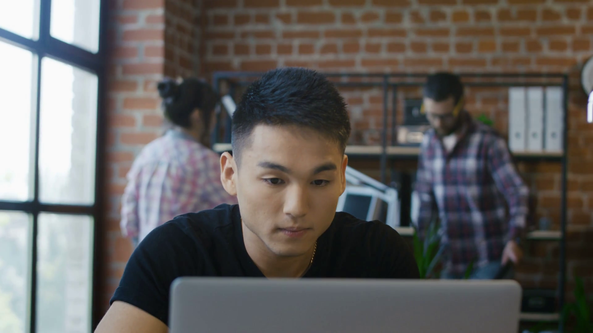 Focused Korean Man Working Diligently At Stock Footage SBV-323849710 ...
