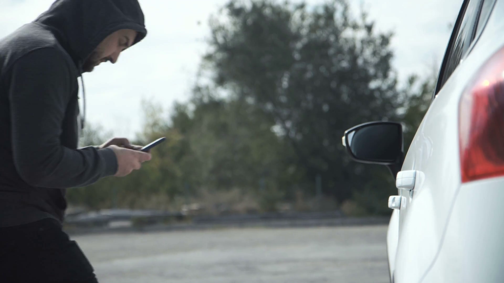 Thief Wearing Hoodie Hacking Car Using Stock Footage SBV-318247367 ...