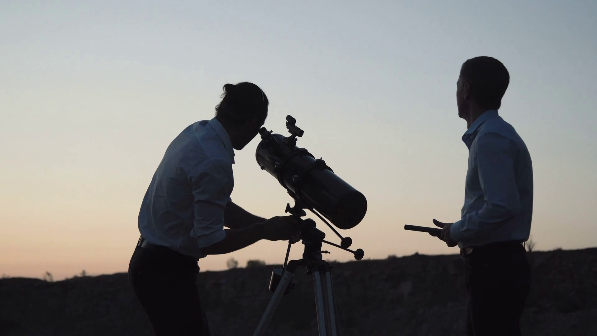 Two Men Looking Through Telescope Stock Footage SBV-317906978 - Storyblocks
