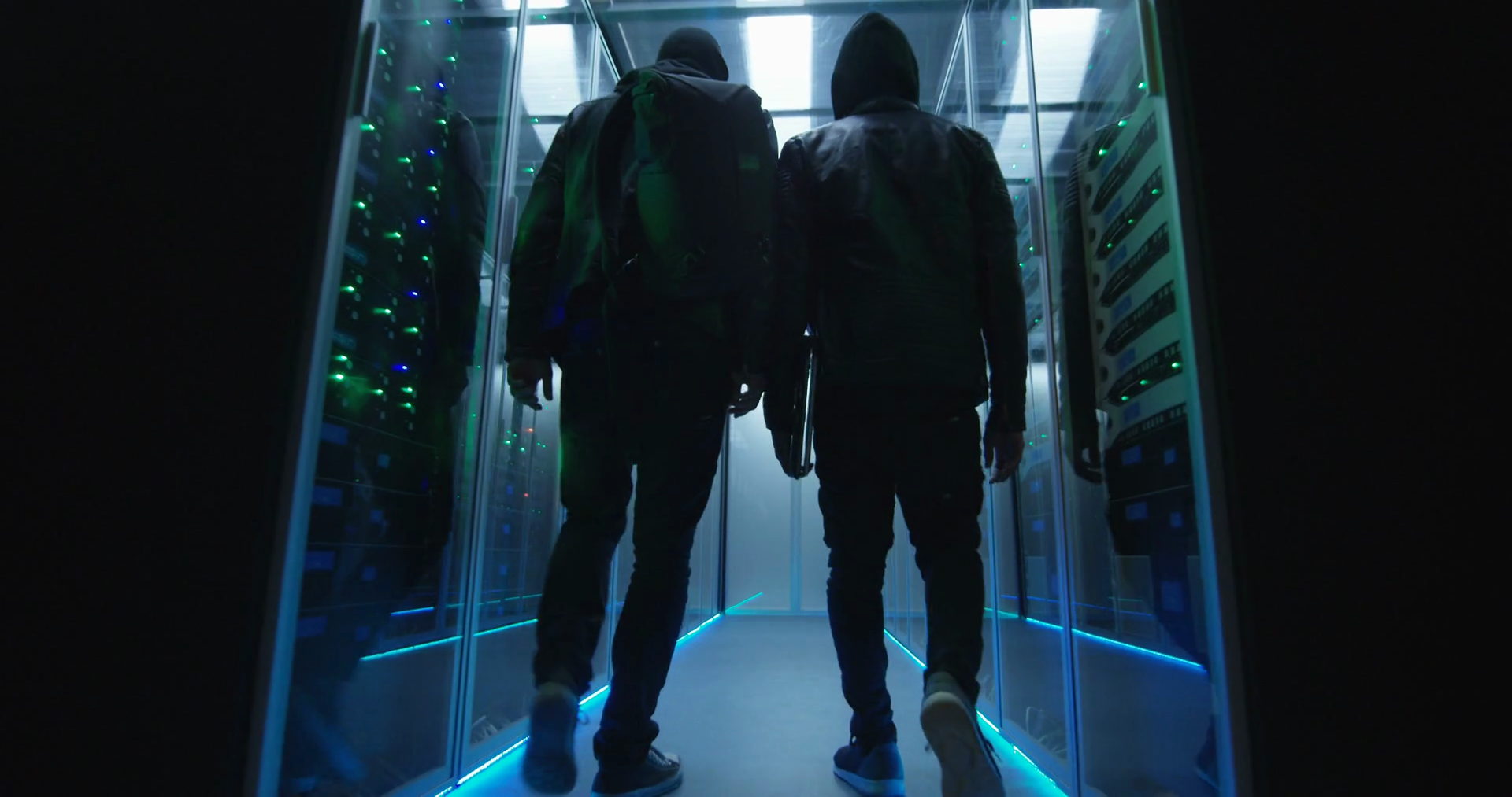 Wide Shot From Behind Of Two Hackers Walking Stock Footage SBV ...