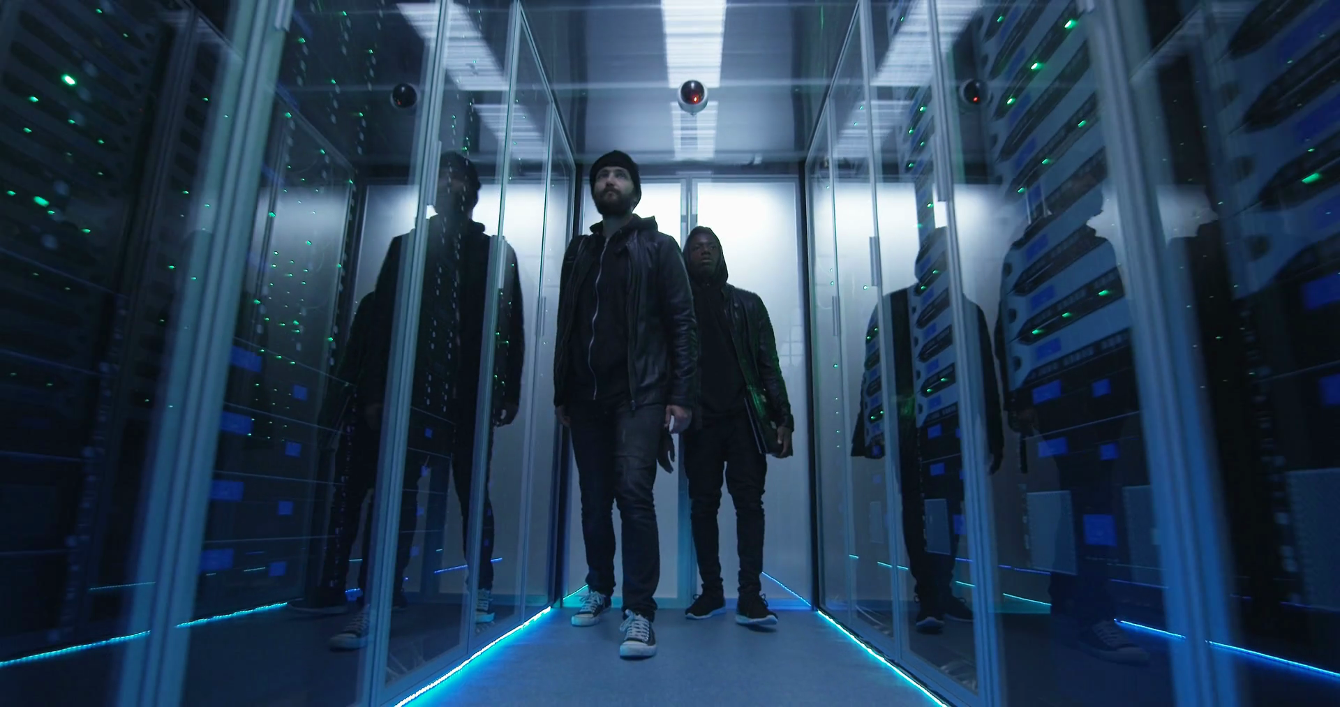 Wide Shot Of Two Hackers Walking Through Stock Footage SBV-328381880 ...