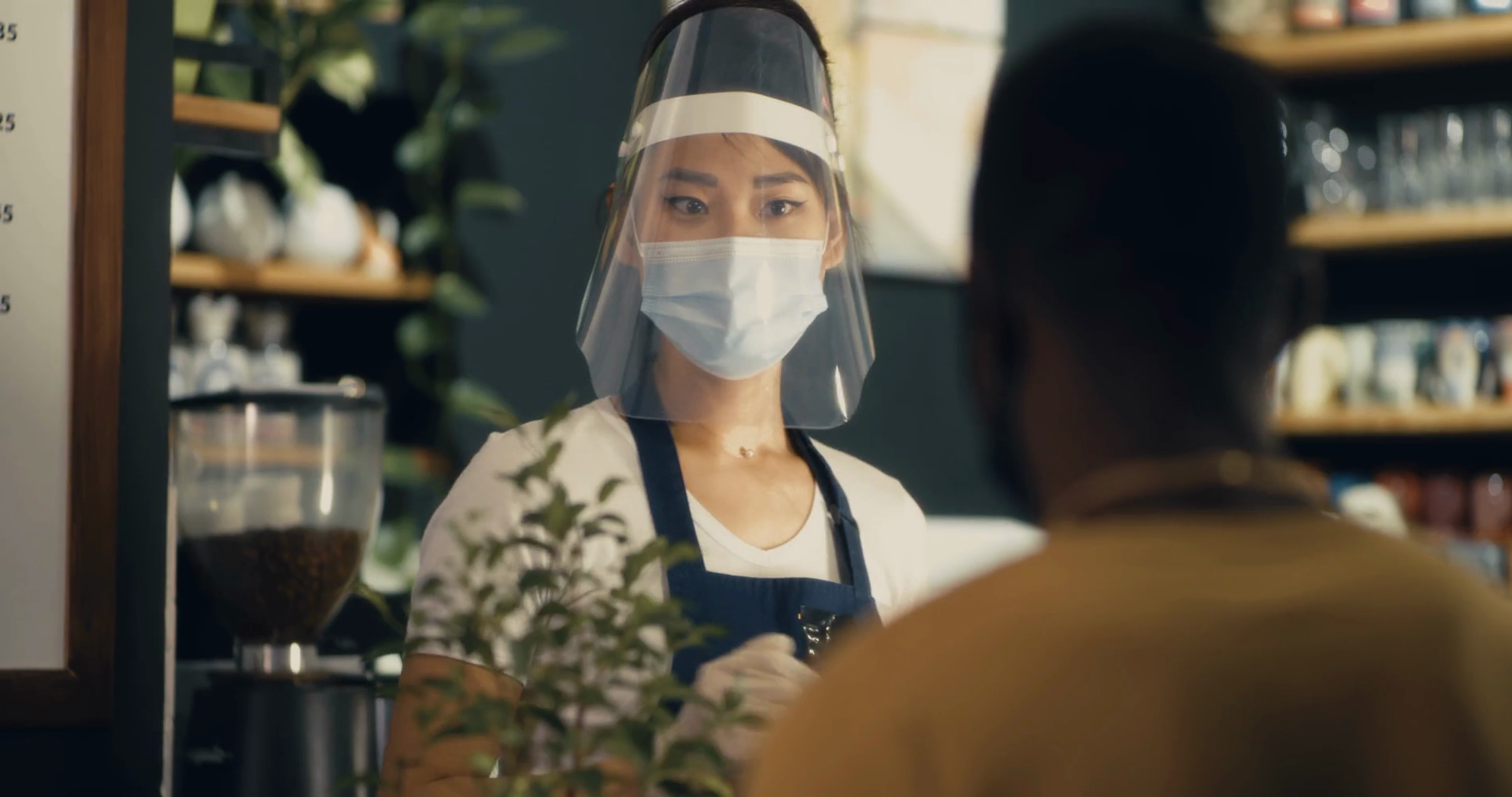 Young Asian Female Cashier In Face Mask Stock Footage SBV-338977312 ...