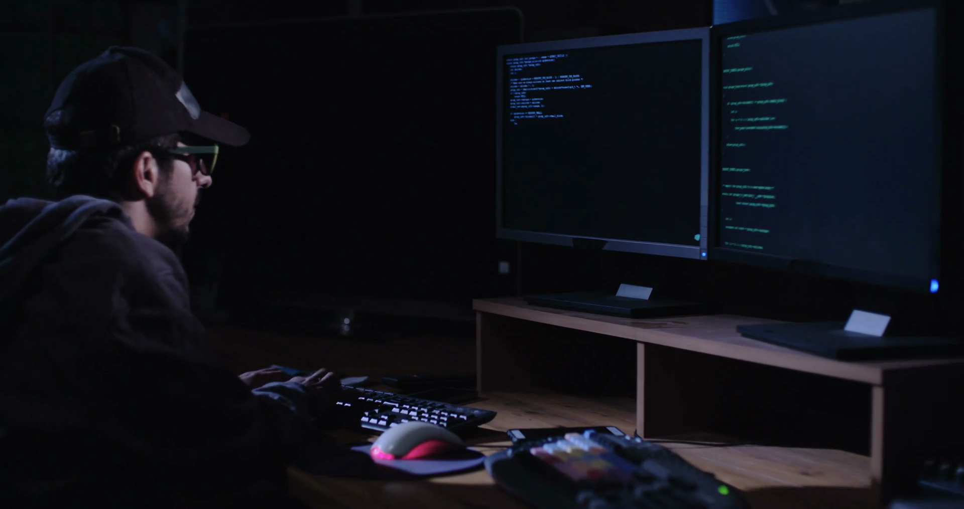 Hacker Sitting In Dark Room In Front Of Stock Footage SBV-309840250 ...