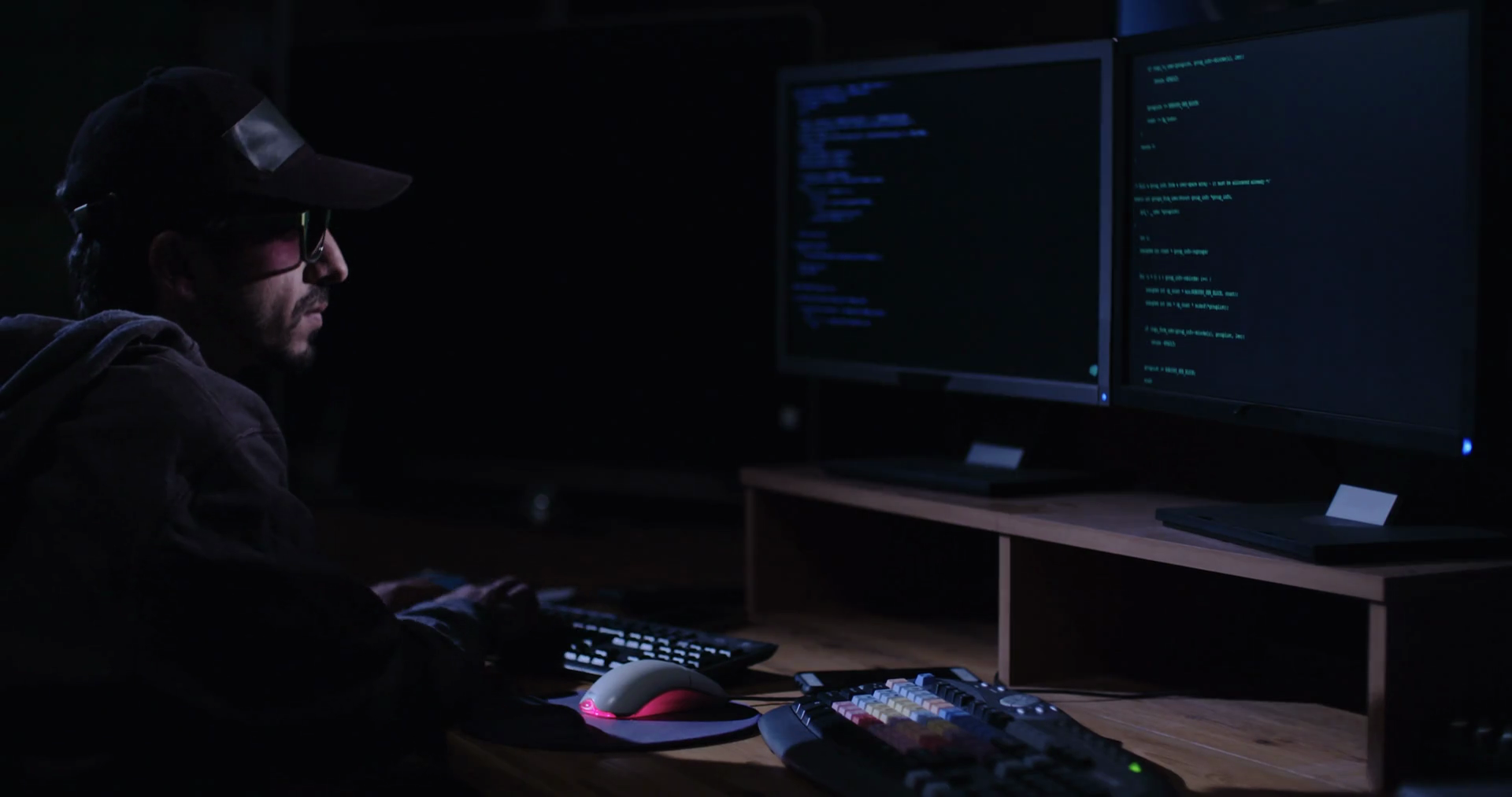 Hacker Sitting In Dark Room In Front Of Stock Footage SBV-309840247 ...
