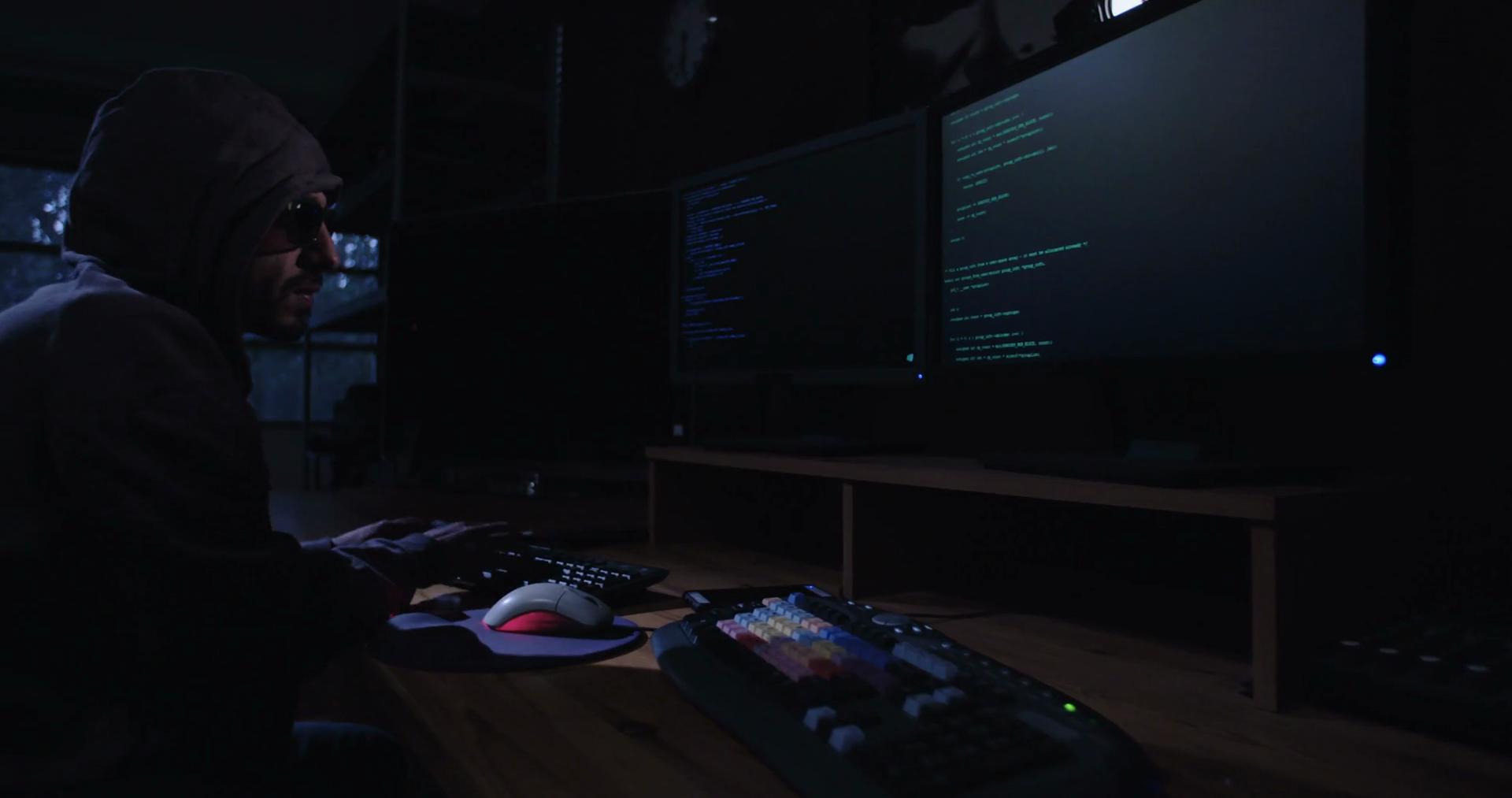 Hacker Sitting In Dark Room In Front Of Stock Footage SBV-309840223 ...