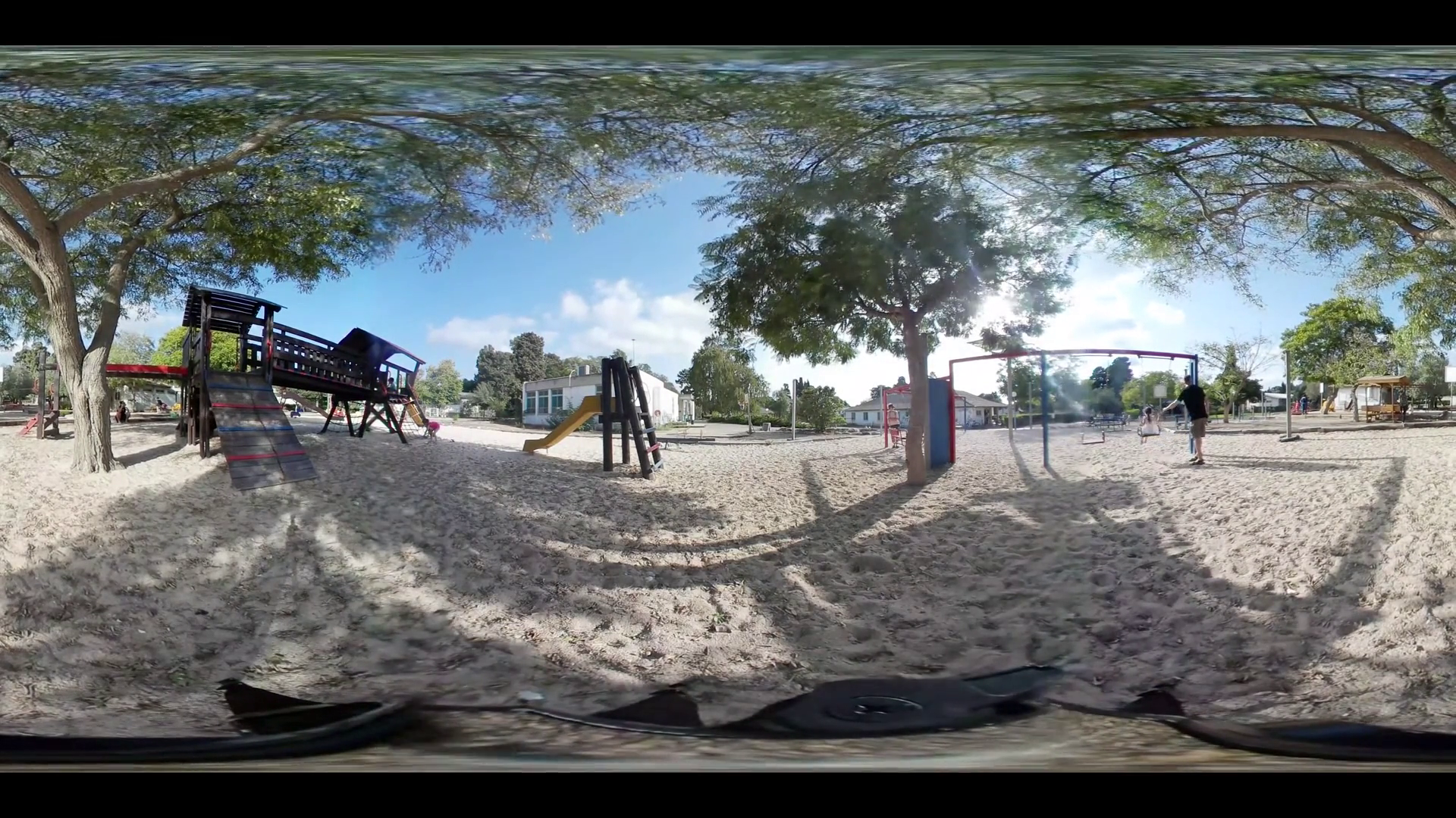 360 VR video of kids playing in a playground - Storyblocks