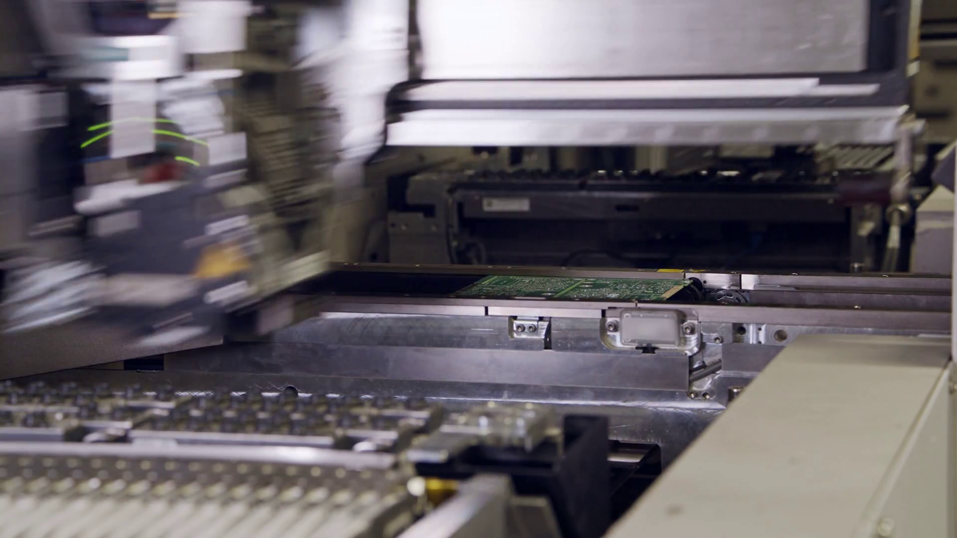 Automated SMT machine placing electronic components on a board. Stock ...