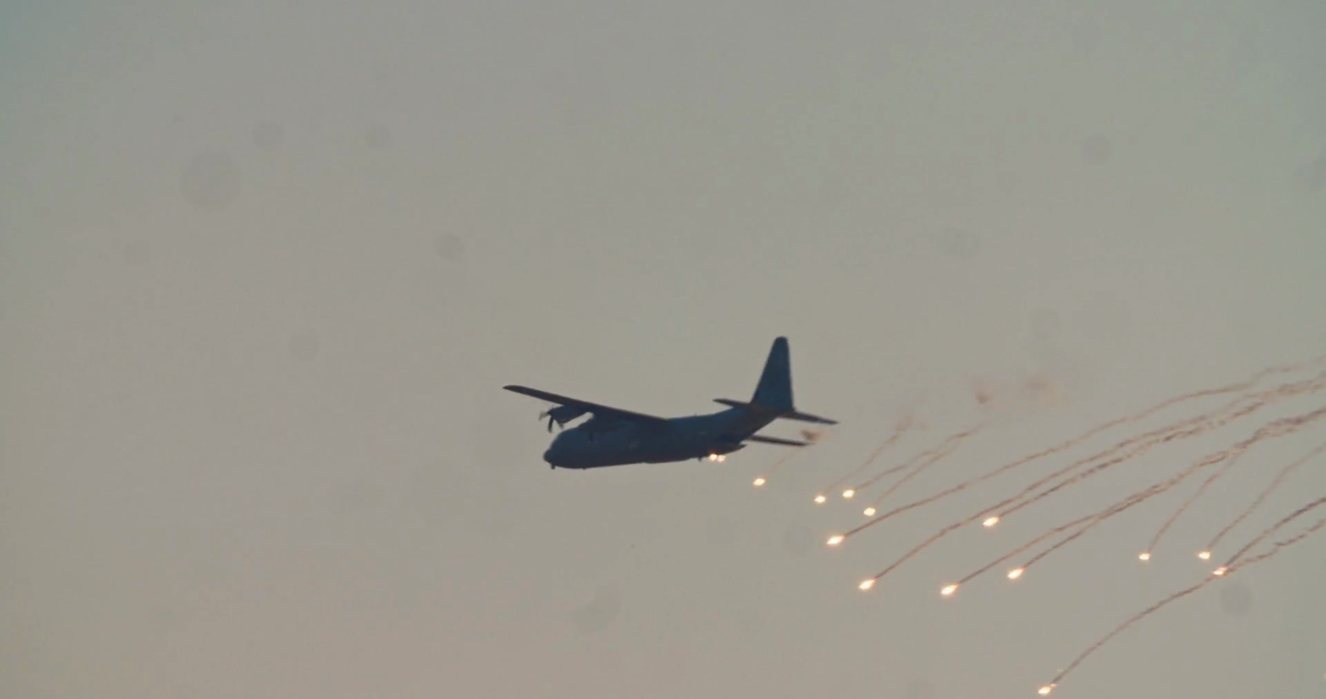 C-130 Transport Plane Dropping Cargo Packs Stock Footage SBV-336266691 ...