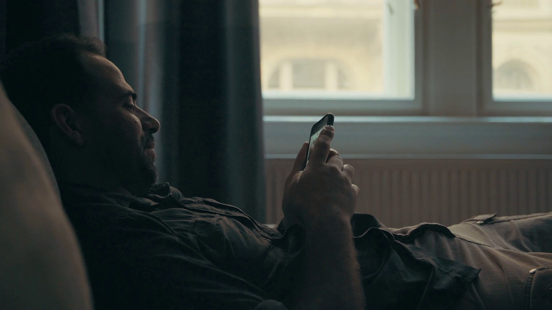 Man Laying Down At Apartment Using Mobile Stock Footage SBV-315369153 ...