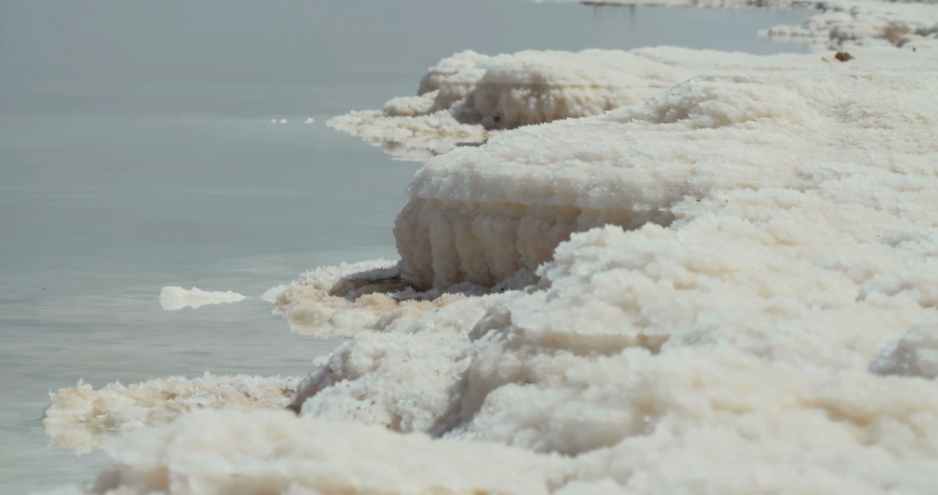 Tracking Shot Of Salt Deposits On Banks Of Stock Footage SBV-321750757 ...