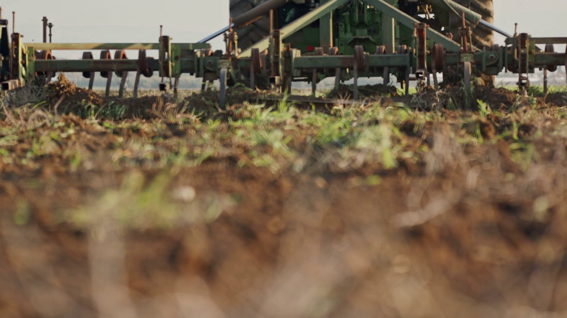 Tractor Cultivating Green Field In Slow Stock Footage SBV-330543138 ...