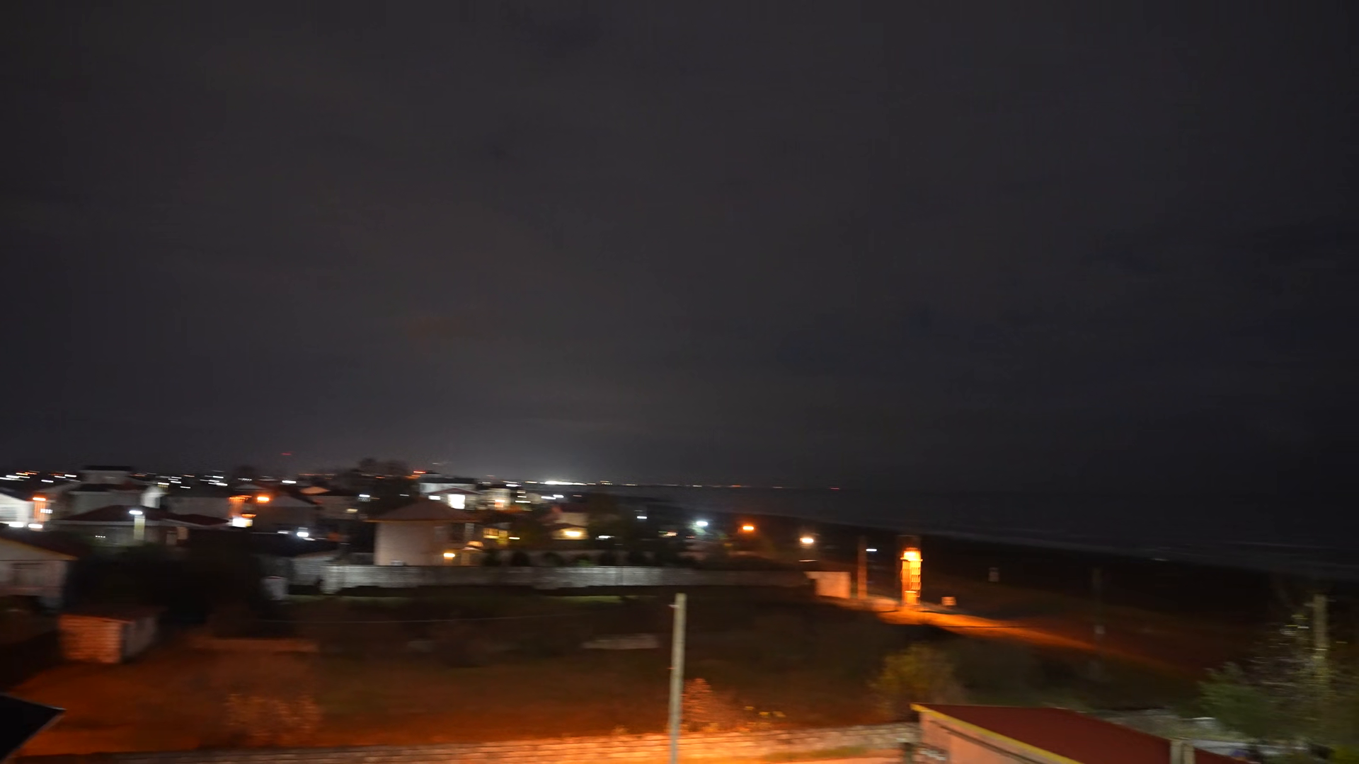 Midnight Shore: Enchanting Coastal Village Stock Footage SBV-353555537 ...