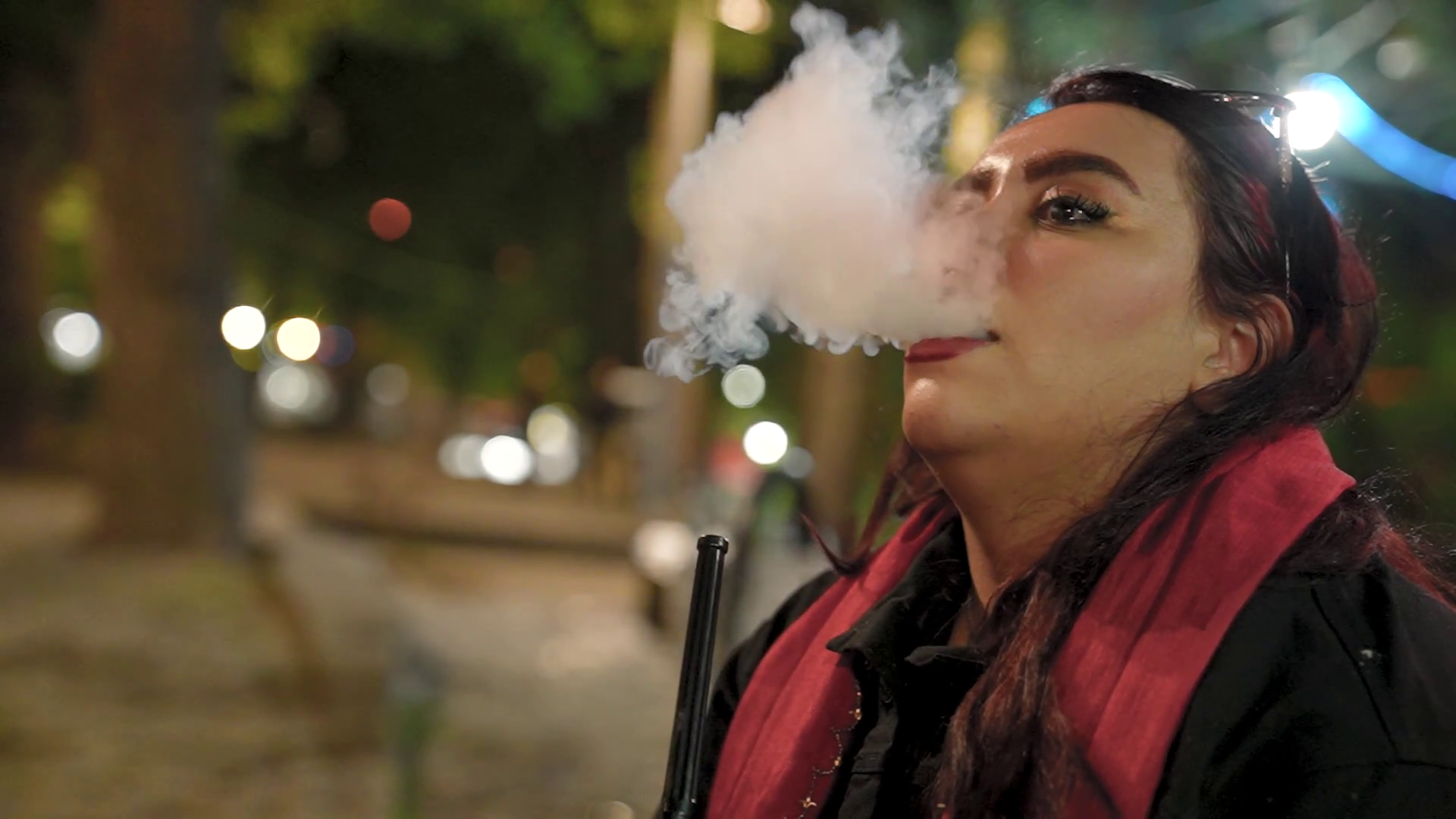 Woman Smoking Hookah In Park At Night Stock Footage SBV-352124131 ...