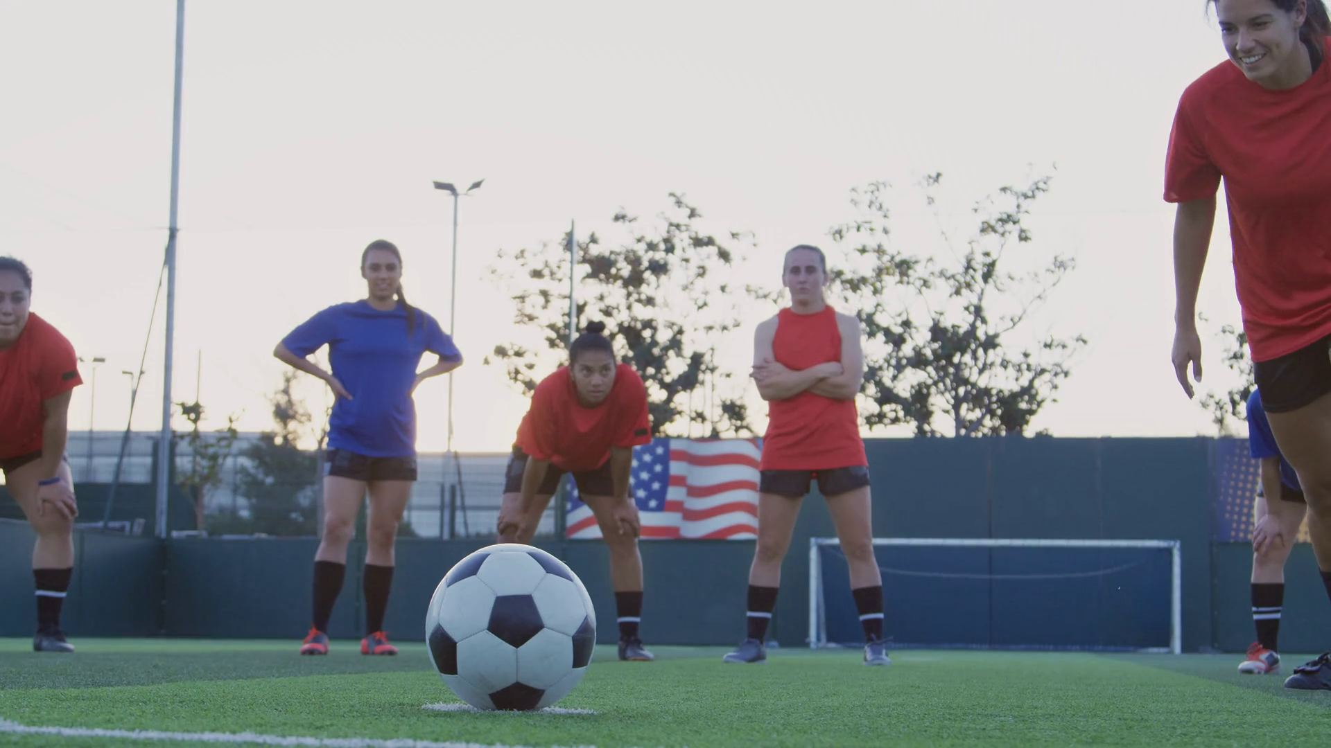 Close Up Of Player Shooting And Scoring Goal From Penalty Kick As Team ...