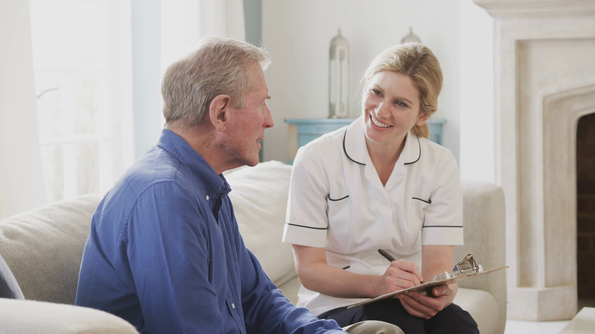 Female Doctor Making Home Visit To Senior Stock Footage SBV-338359943 ...