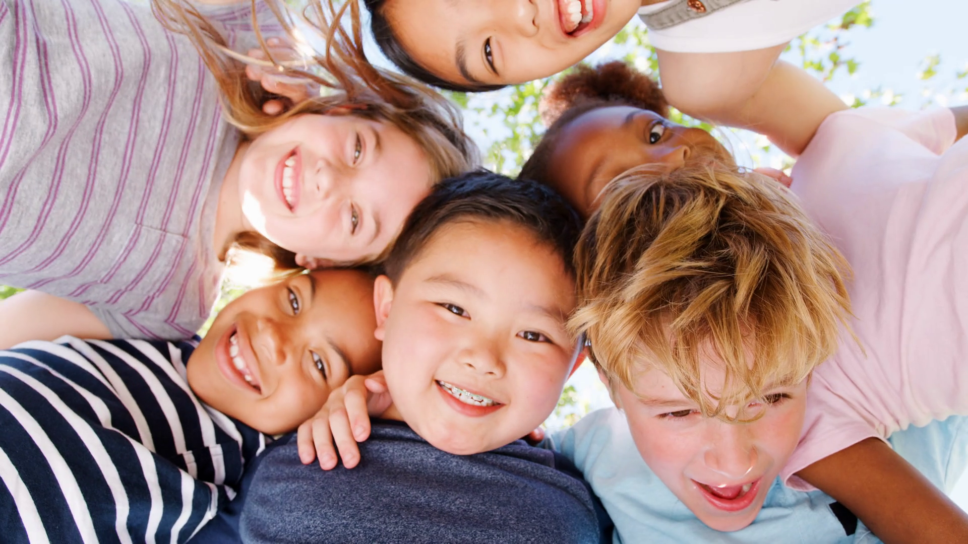 Low Angle Portrait Looking Up Into Faces Of Stock Footage SBV-328046801 ...