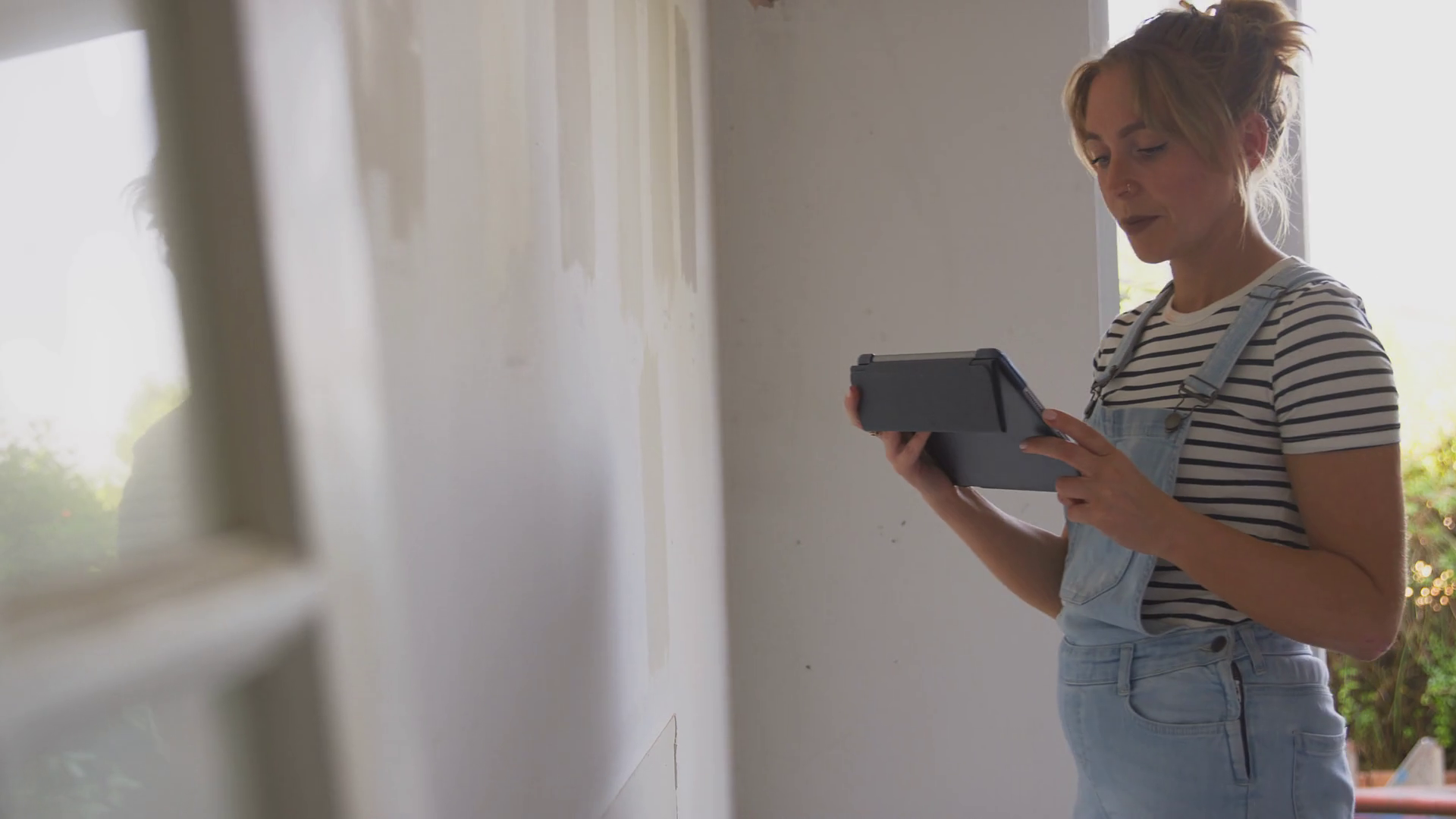 Woman With Digital Tablet Decorating Room In Stock Footage SBV ...