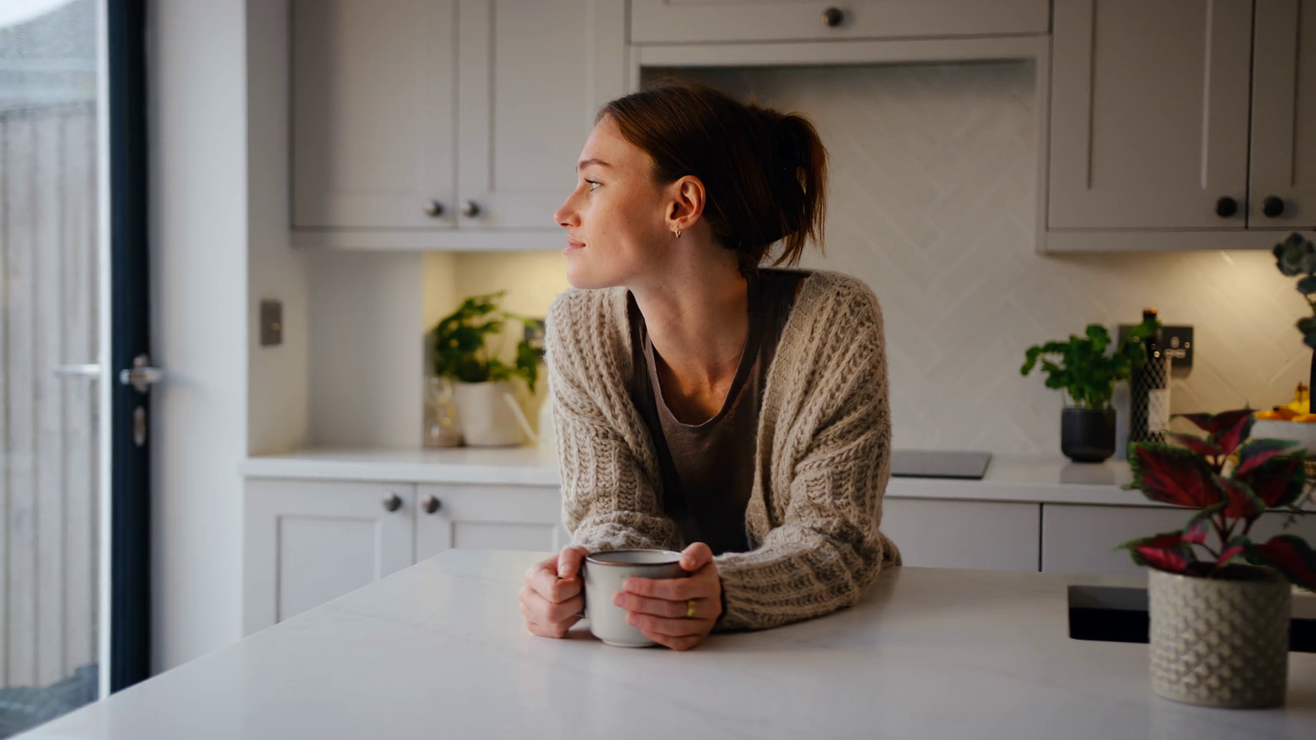 Portrait Of Young Woman Leaning On Kitchen Stock Footage SBV-348734692 ...