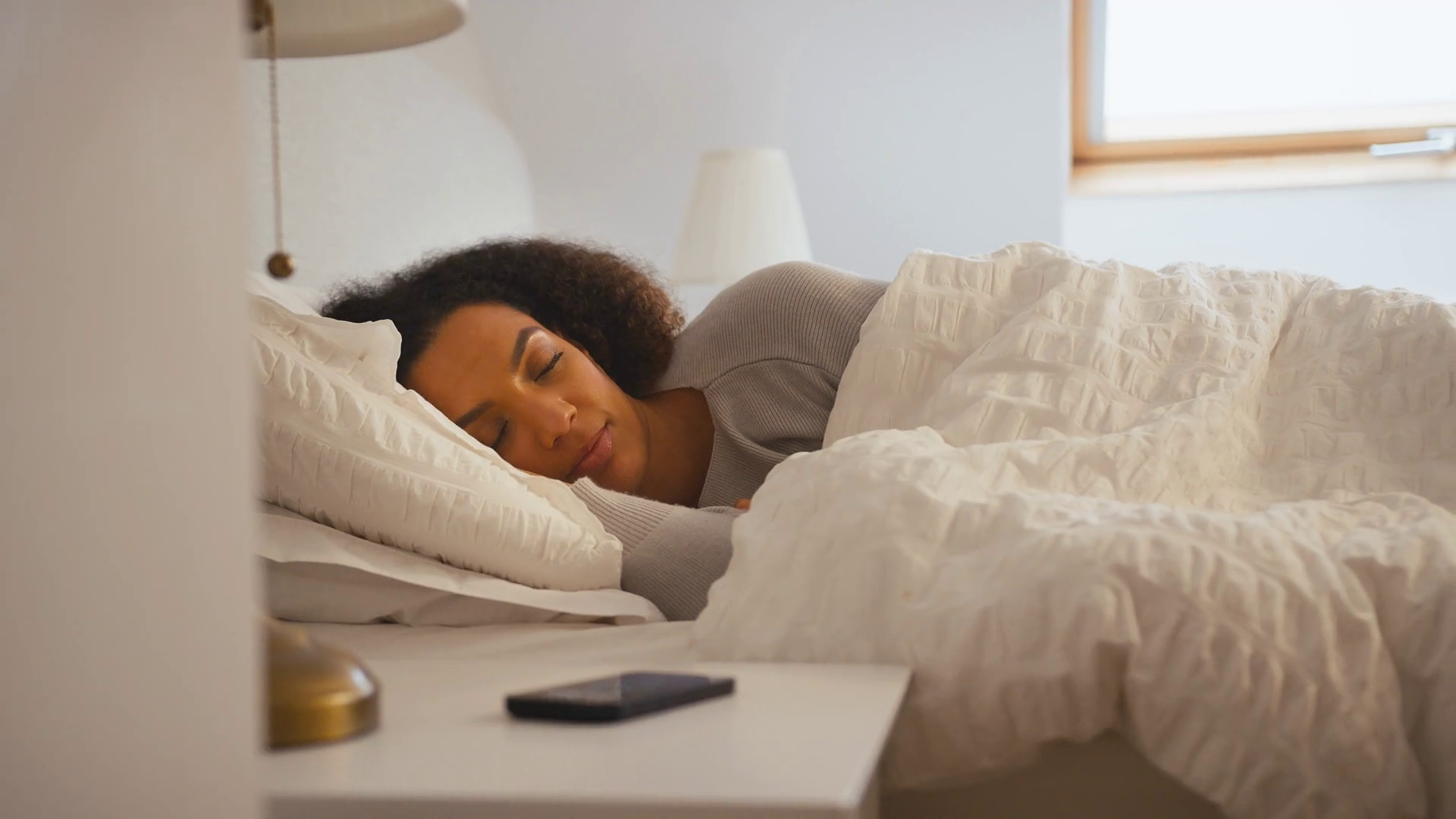Woman At Home In Bed Turning Off Alarm On Stock Footage SBV-348713655 ...