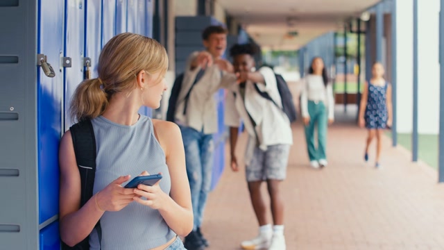 School Student On Cell Phone Stock Footage: Royalty-Free Video Clips ...