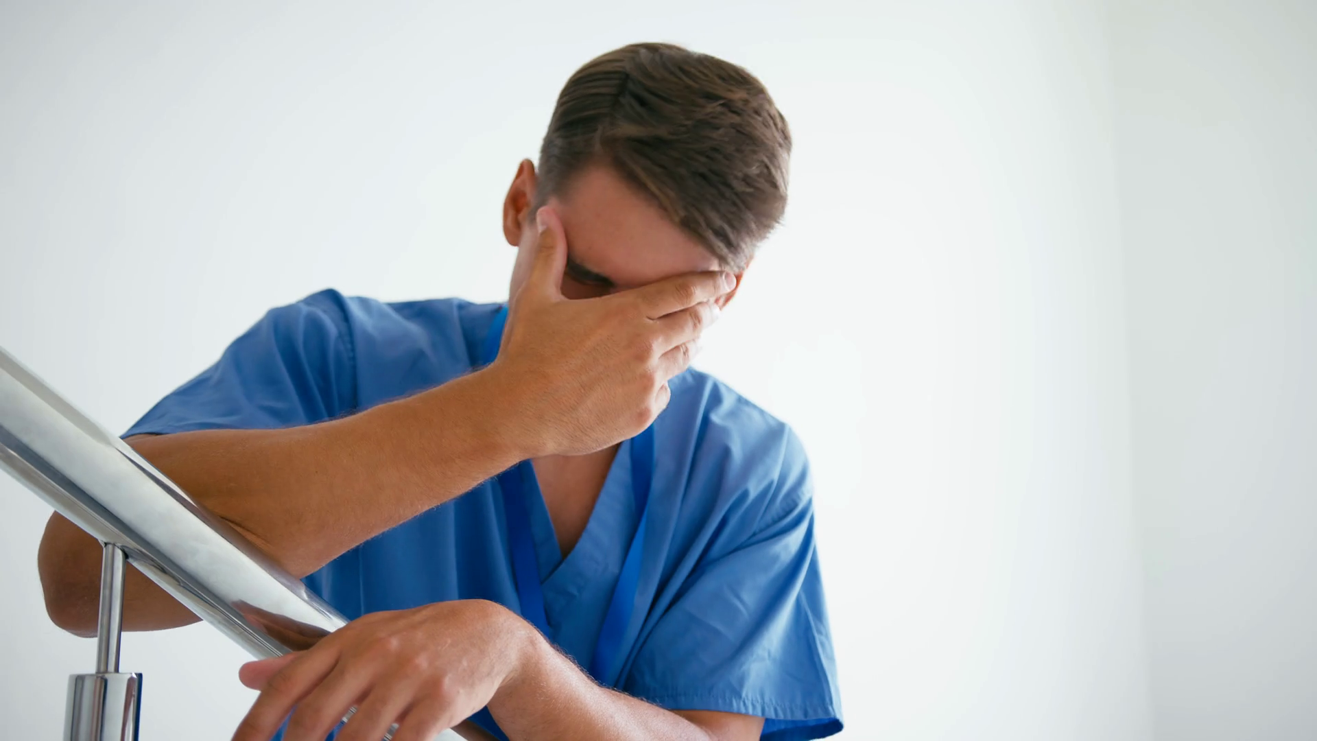 Stressed Male Doctor Nurse Wearing Scrubs Stock Footage SBV-347675356 ...