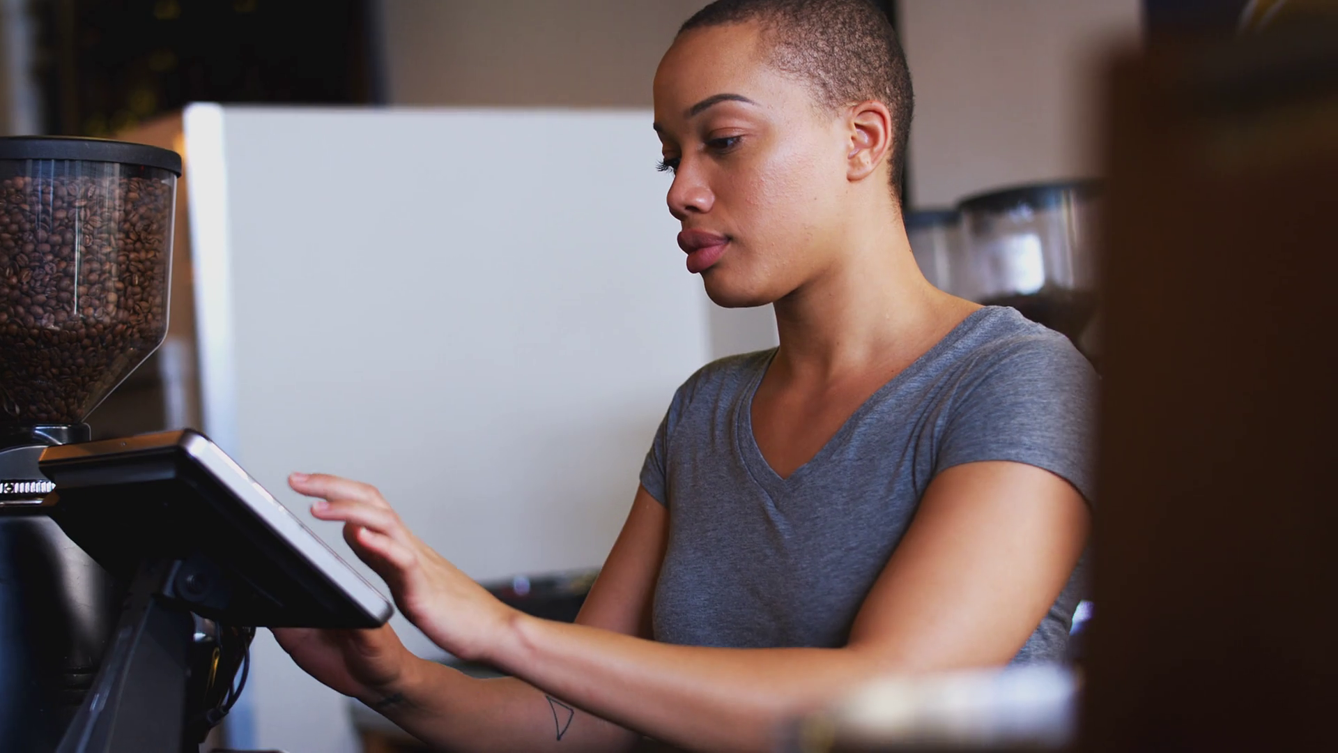 Portrait Of Female Coffee Shop Owner Standing At Sales Desk Stock Video portrait-of-female-coffee-shop-owner-standing-at-sales-desk-stock-video