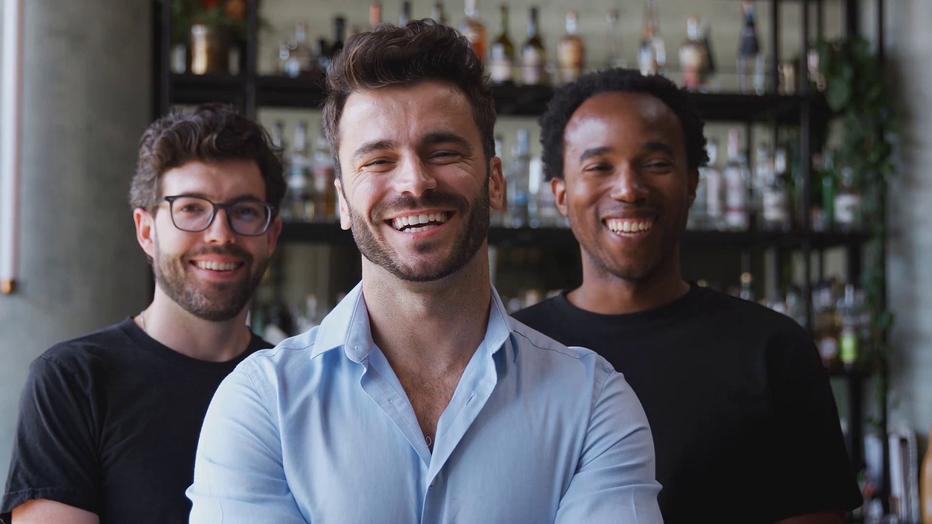 Portrait Of Male Owner Of Restaurant Bar With Team Of Male Waiting ...