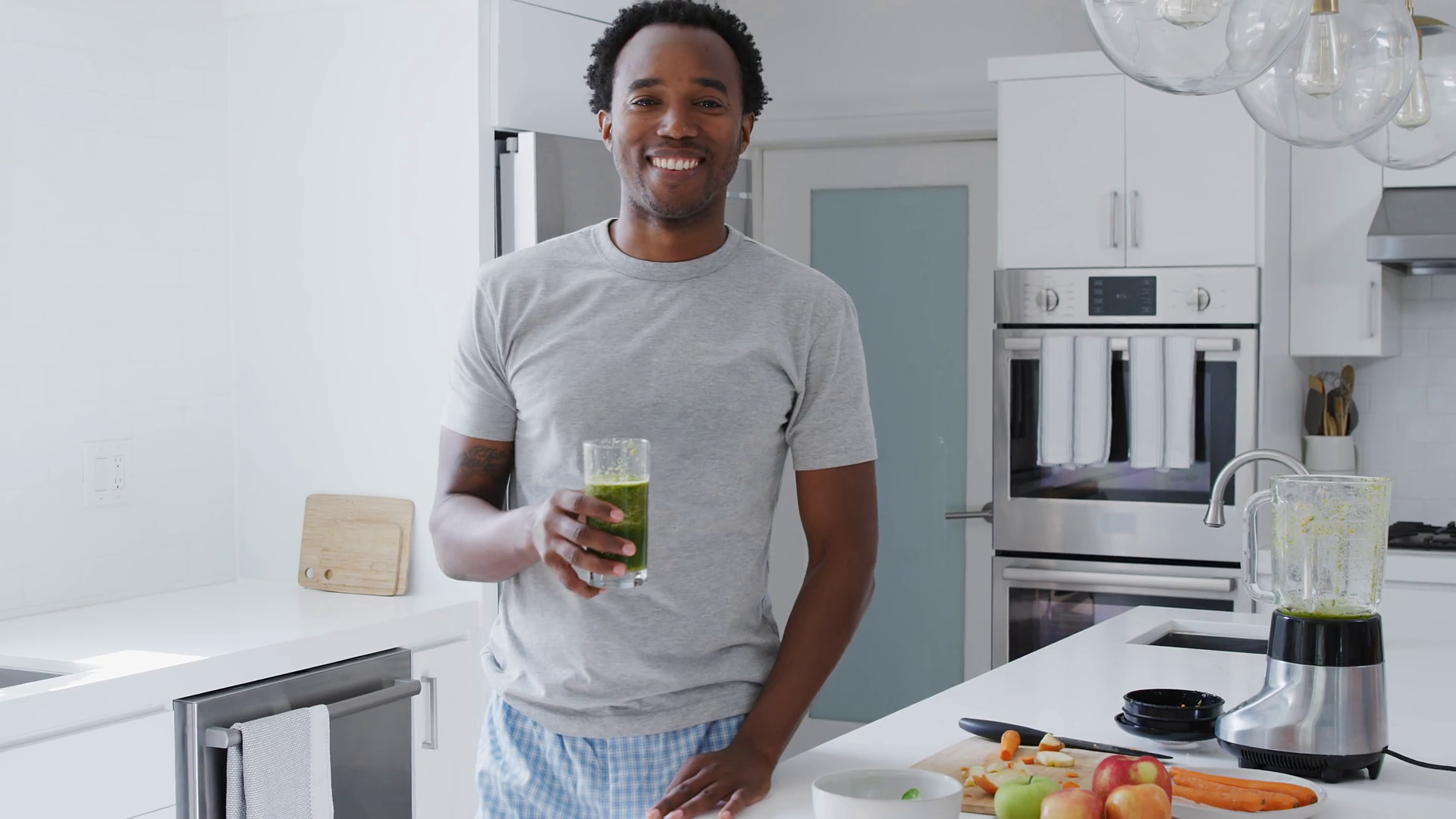Portrait Of Man Wearing Pyjamas In Kitchen Stock Footage SBV-338464530 ...