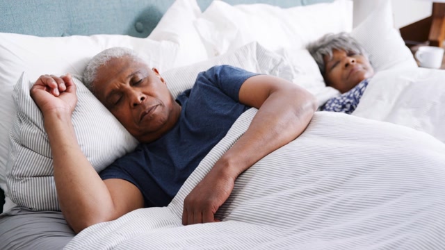 Man And Woman Stealing Covers In Bed Stock Footage: Royalty-Free Video ...