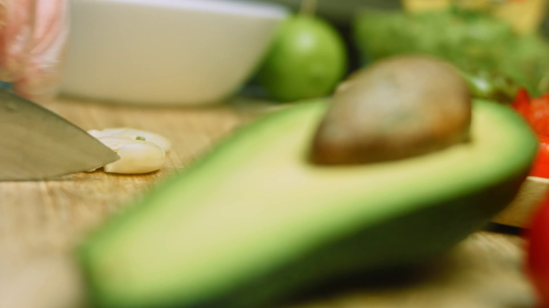 Finely chop the garlic. Macro shooting Stock Video Footage 00:24 SBV ...