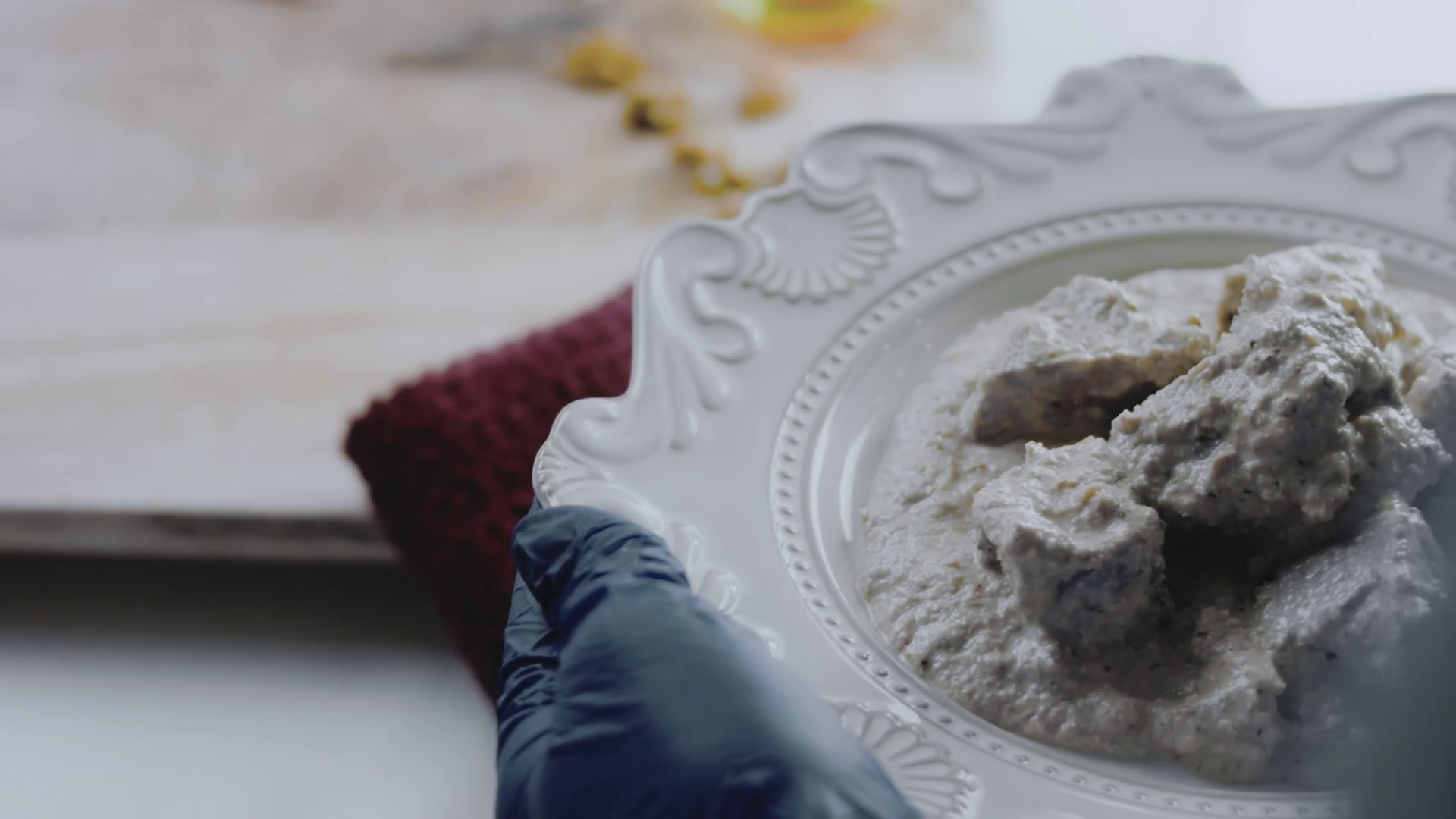 The Woman Puts Plate Of Satsivi On Table Stock Footage SBV-348501090 ...