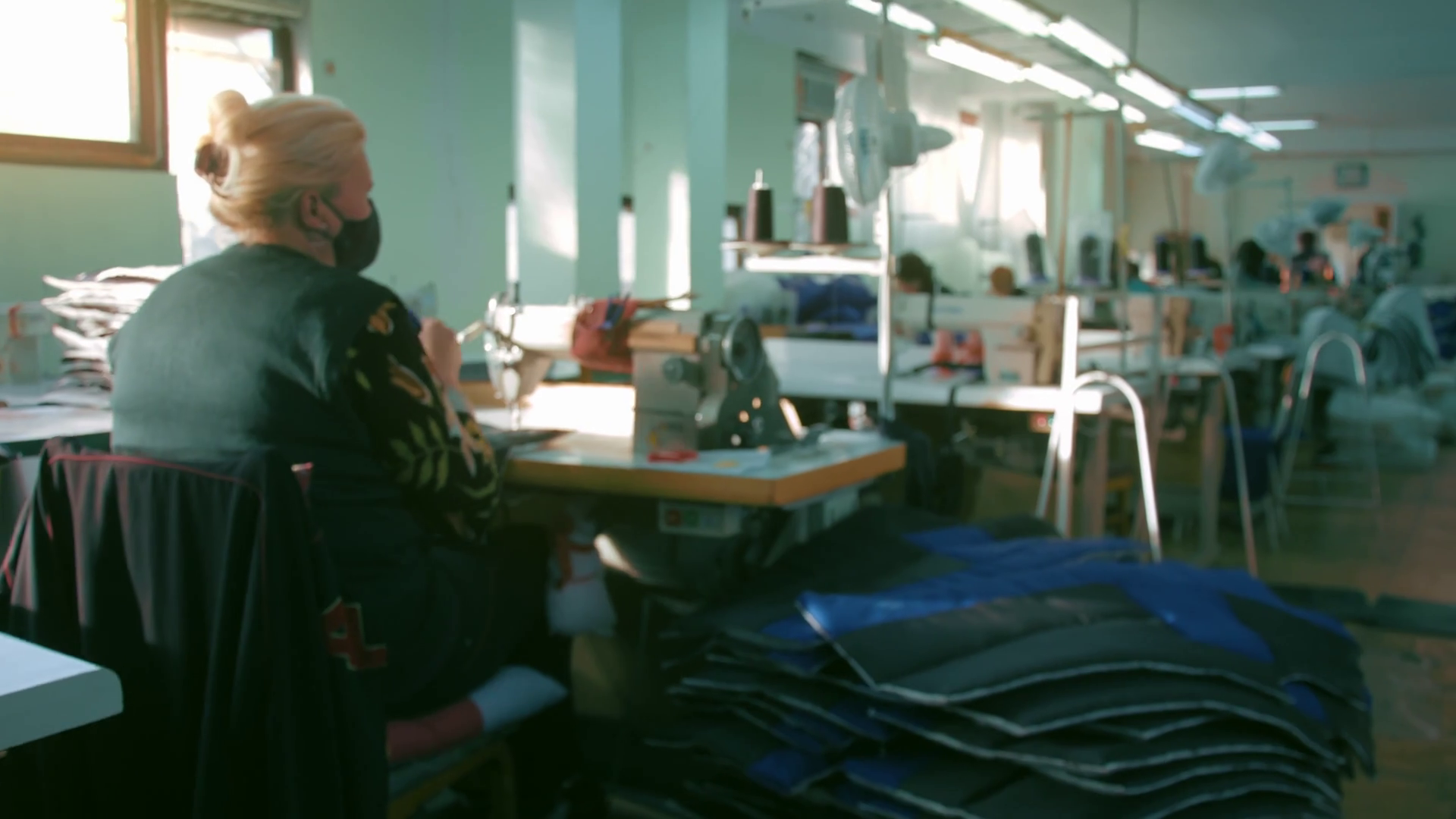 People with disabilities sew specialized clothing Stock Video Footage ...