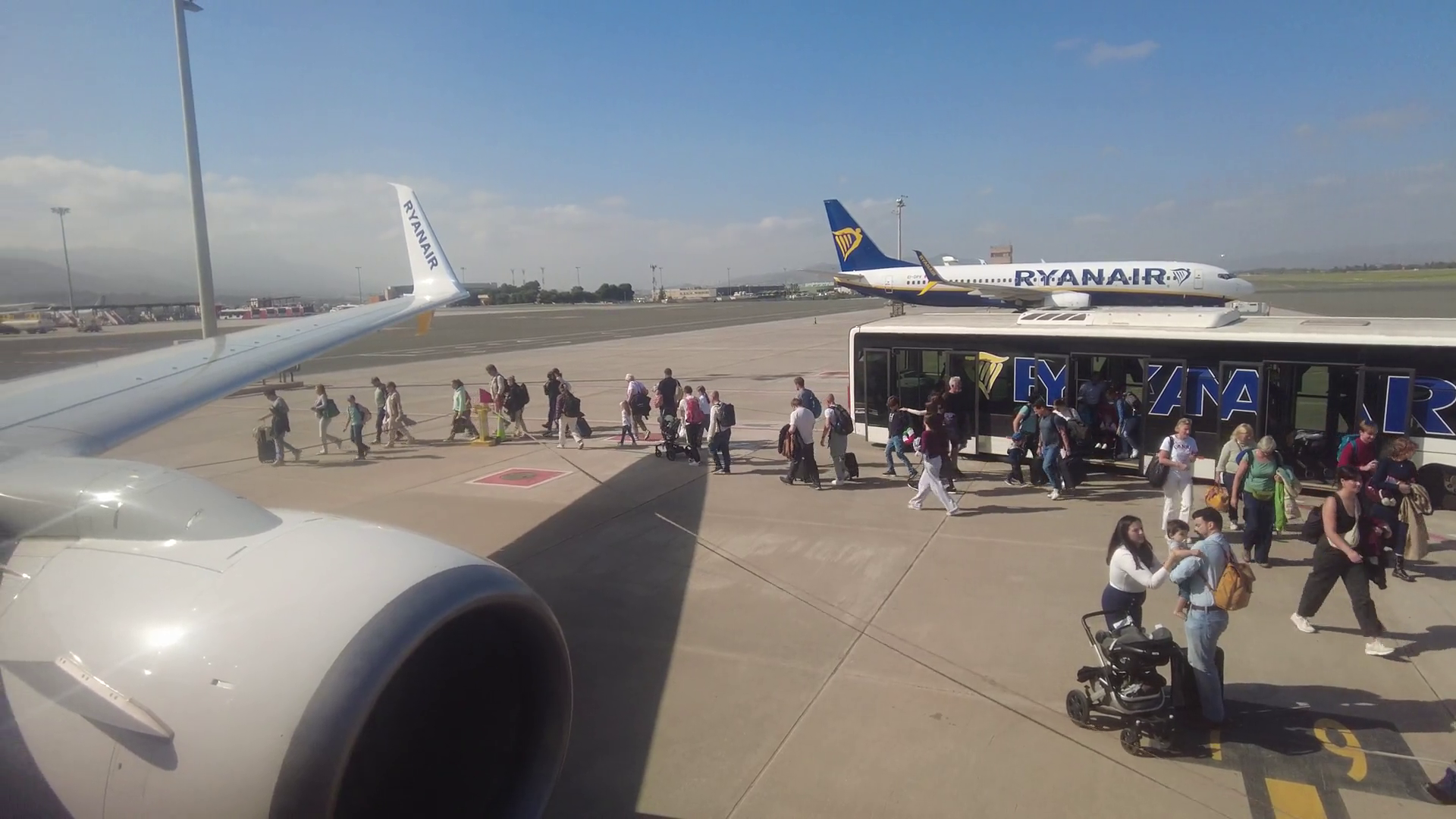Passengers Disembark Bus To Board Ryanair Stock Footage SBV-352715401 ...