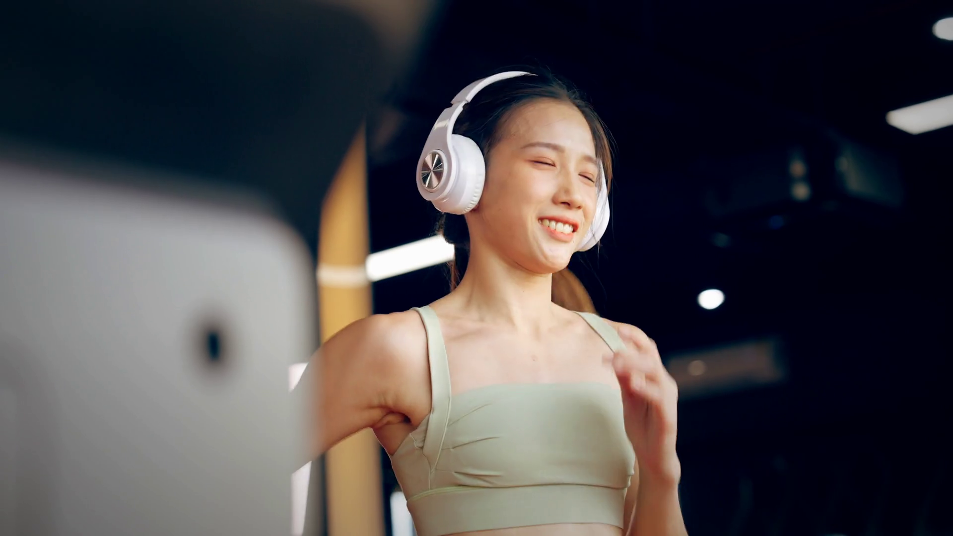 Young Asian Woman Wearing Headset Running On Stock Footage SBV ...