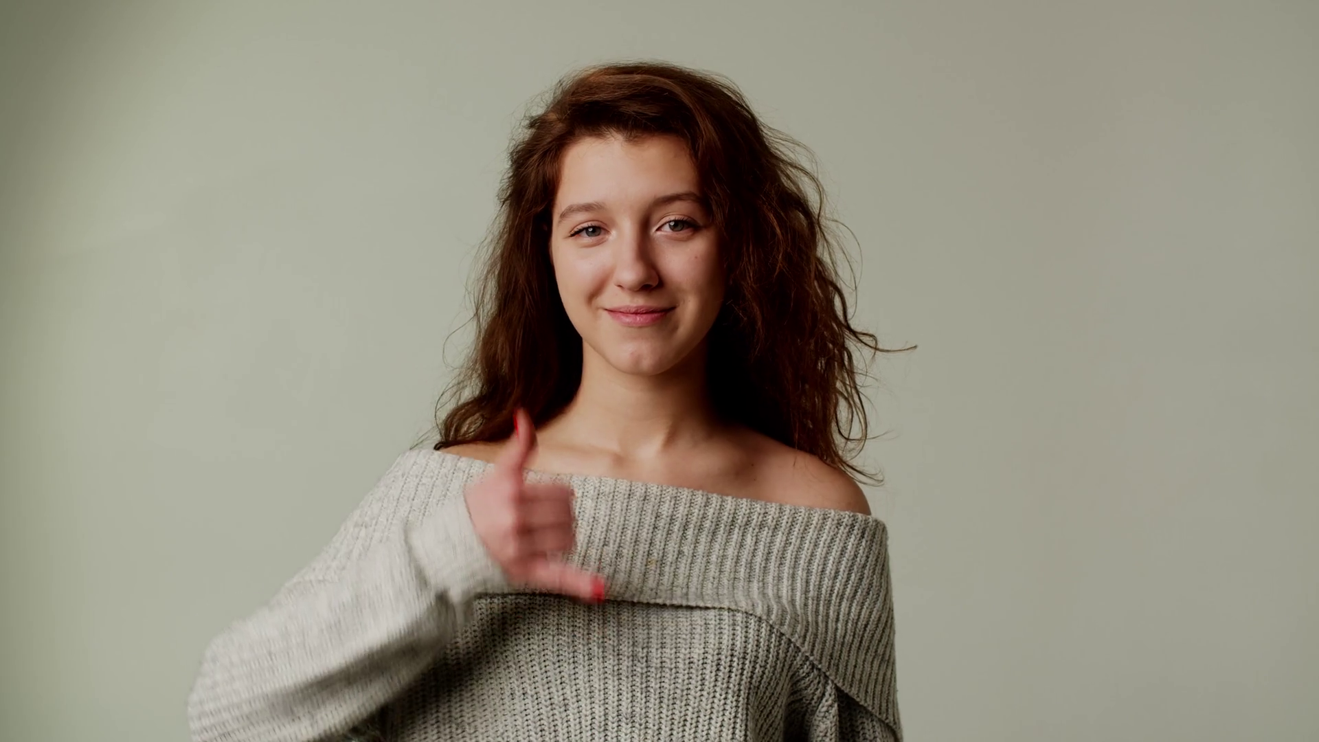 A Charming Girl With Playful Emotions Flirts Stock Footage SBV ...