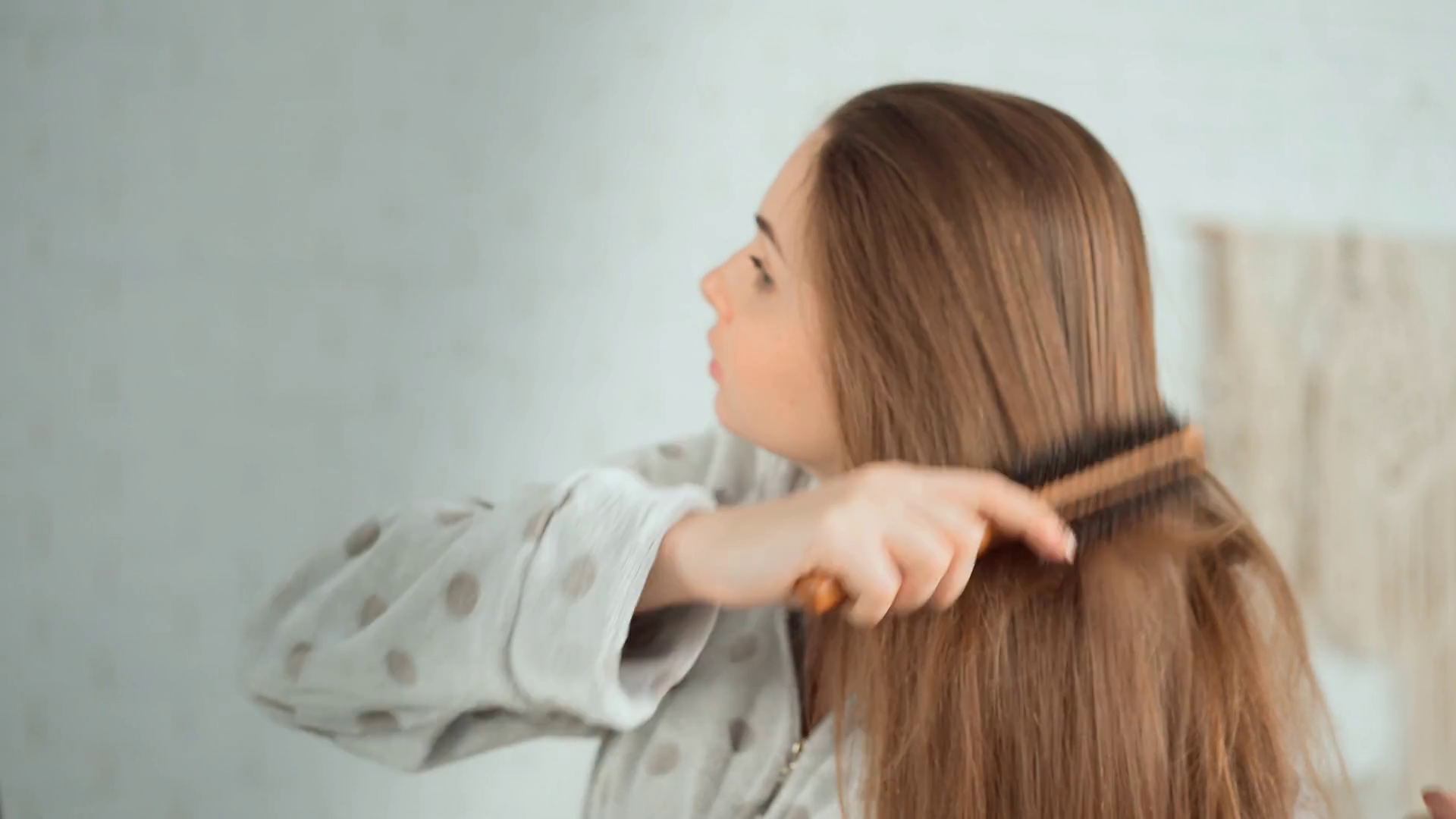 Young Beautiful Girl Combs Hair In Front Of Stock Footage SBV-346522504 ...
