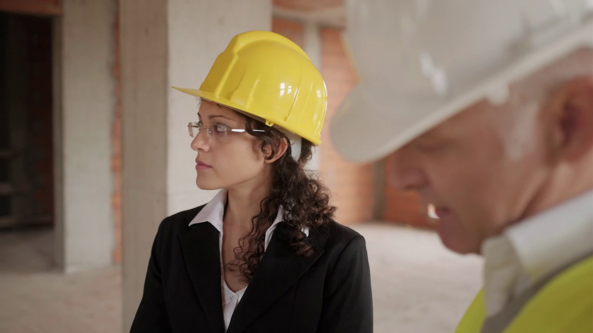 People working in construction site. Men and woman at work in new ...