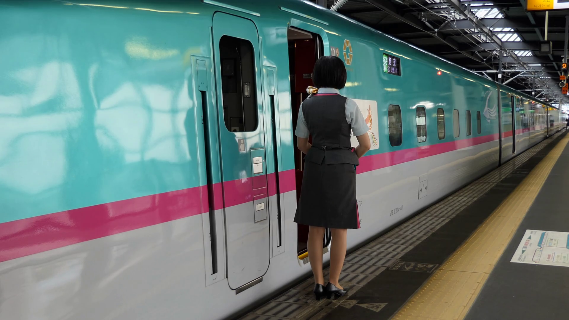 Woman At Work On E5 Series Shinkansen Bullet Stock Footage SBV ...