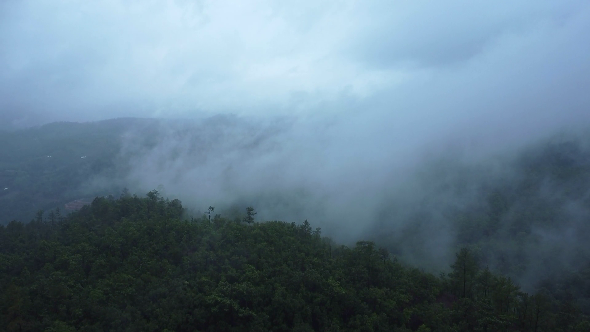 Aerial View Of Fog Flowing Over Mountain Stock Footage SBV-352230104 ...