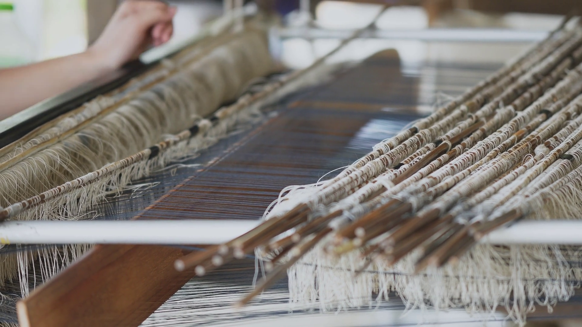 Close-up Of Woman's Hands Weaving Yarn Using Stock Footage SBV ...