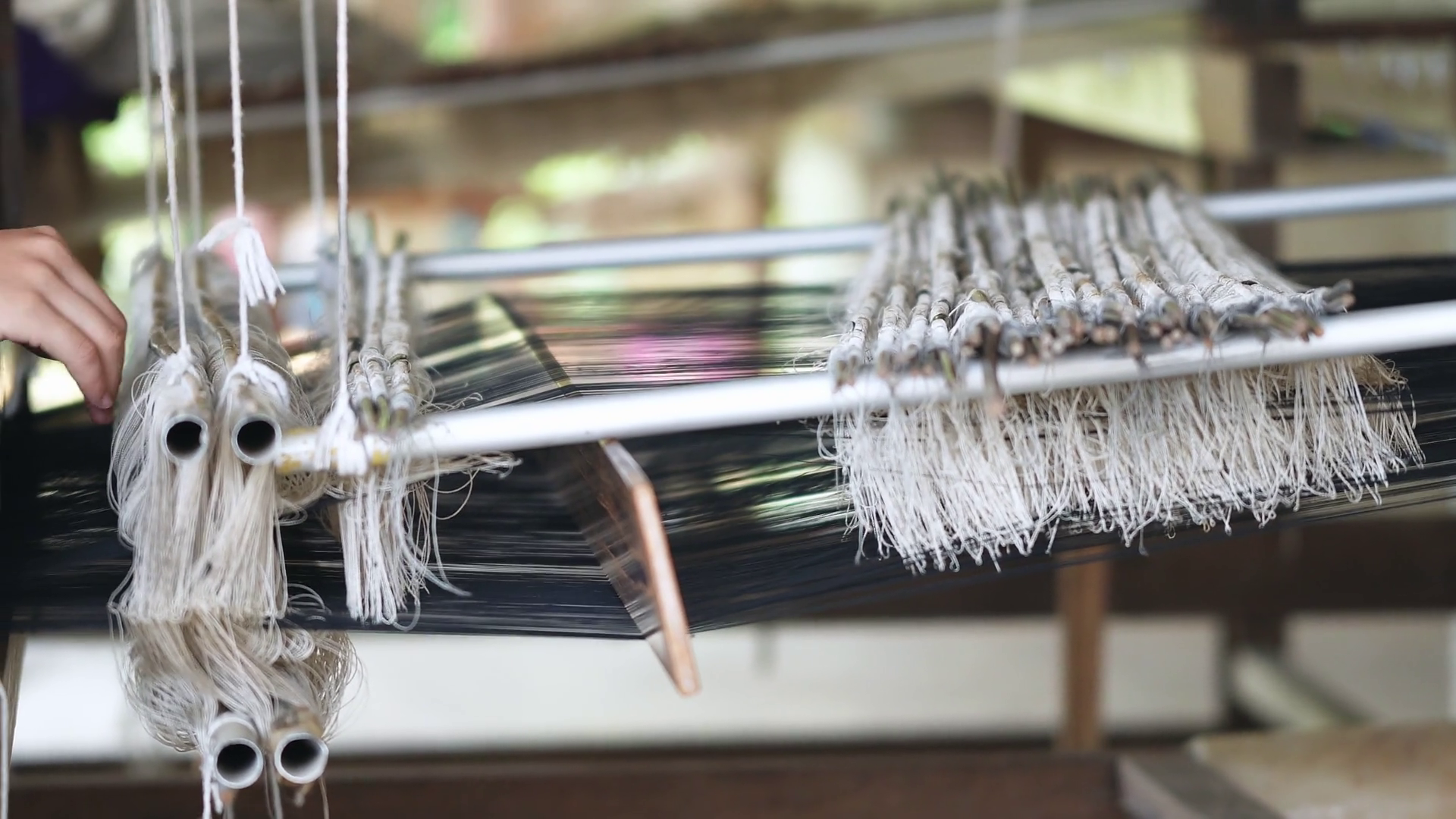 Close-up Of Woman's Hands Weaving Yarn Using Stock Footage SBV ...