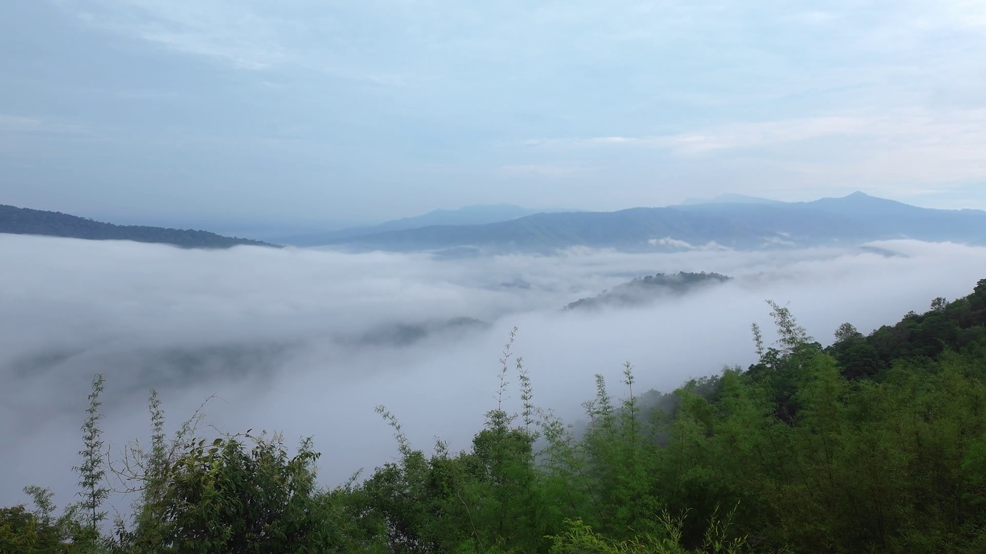 Aerial View Of Fog Flowing Over Mountain Stock Footage SBV-352212621 ...