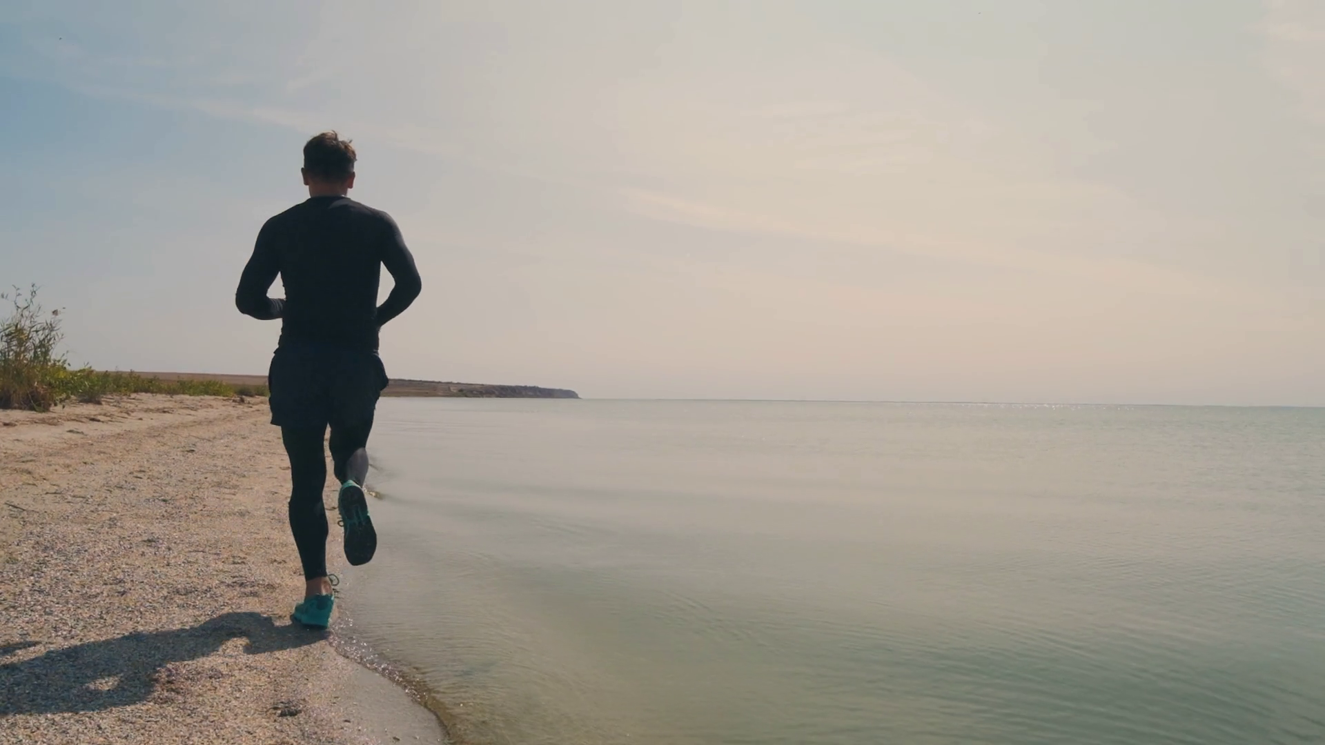 The Man Running Along Sea Shore Slow Motion Stock Footage SBV-338910216 ...